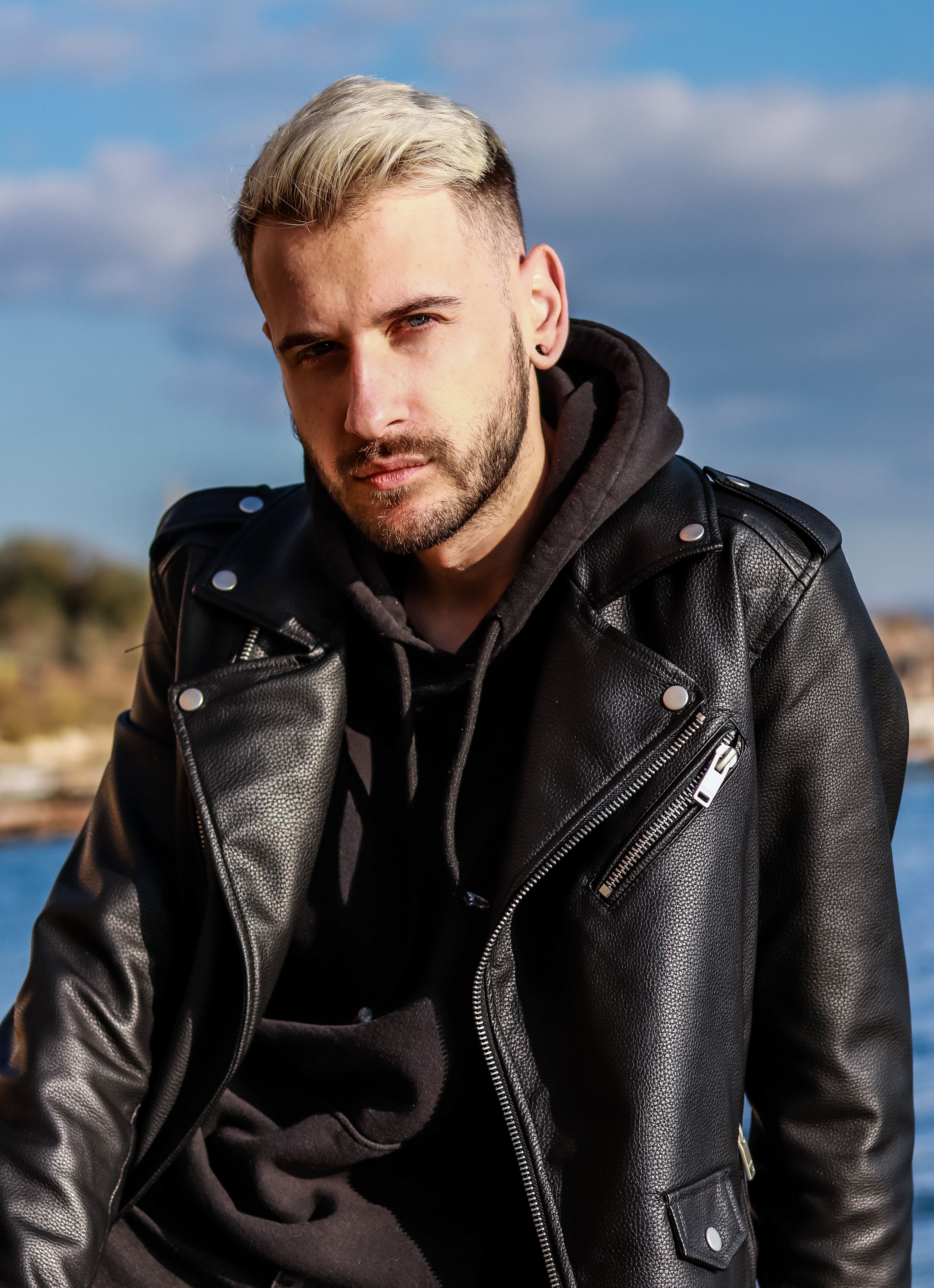 Man wearing Black Branded Jacket · Free Stock Photo