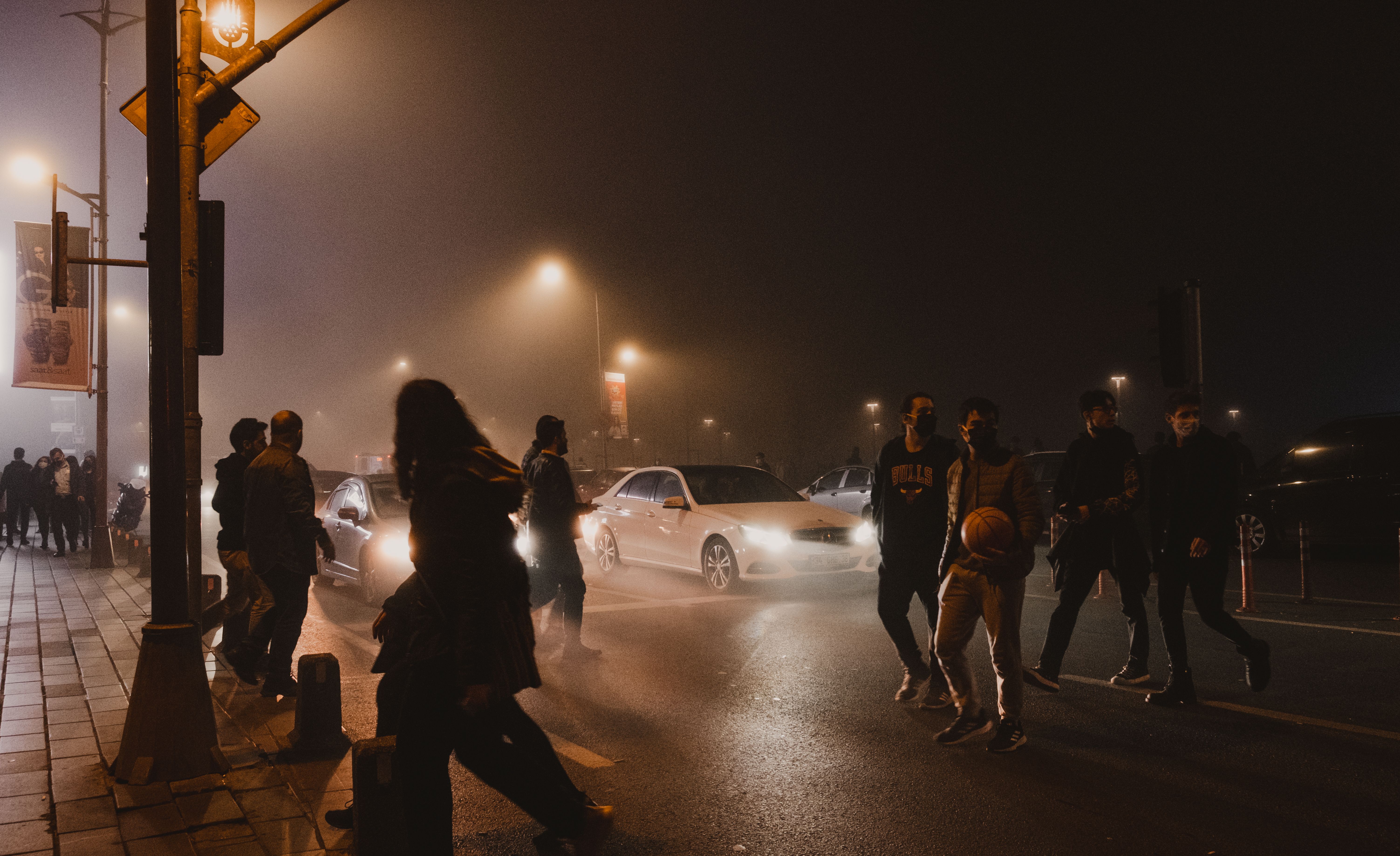 People Crossing the Road During Night Time · Free Stock Photo