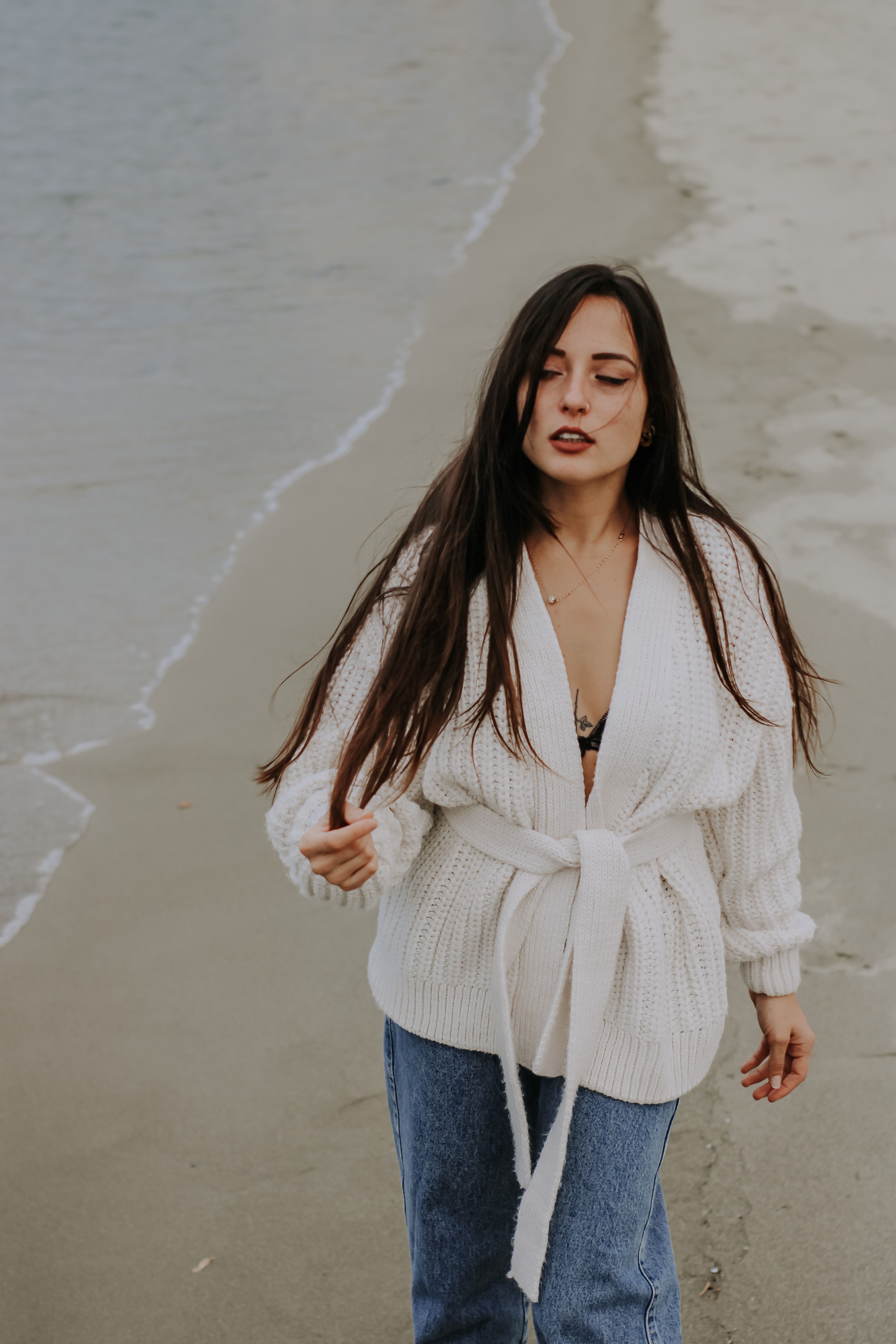 Woman in a White Robe Walking at the Beach · Free Stock Photo