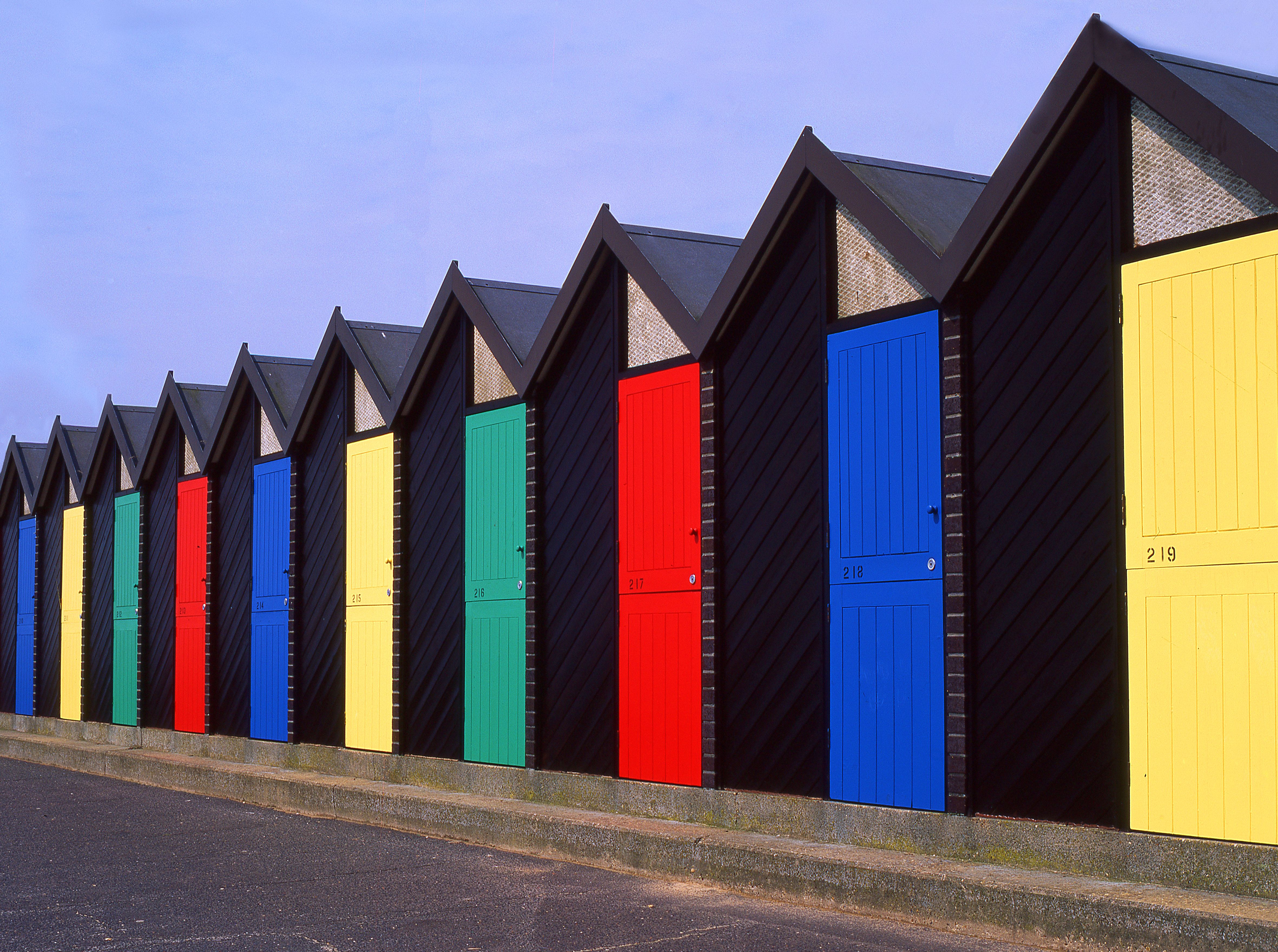 Colorful Wooden Huts on Beach · Free Stock Photo