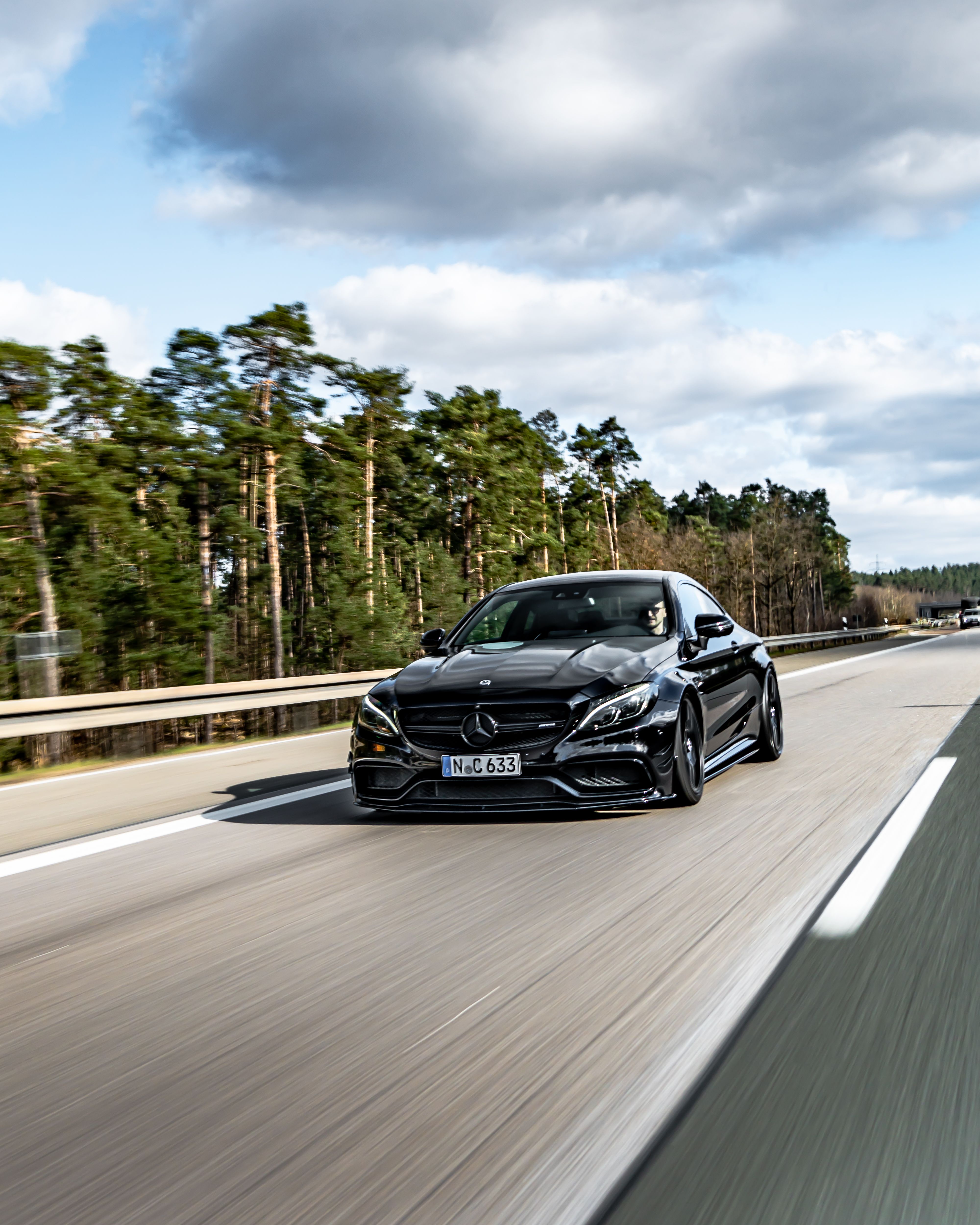 Black Sedan on Road · Free Stock Photo