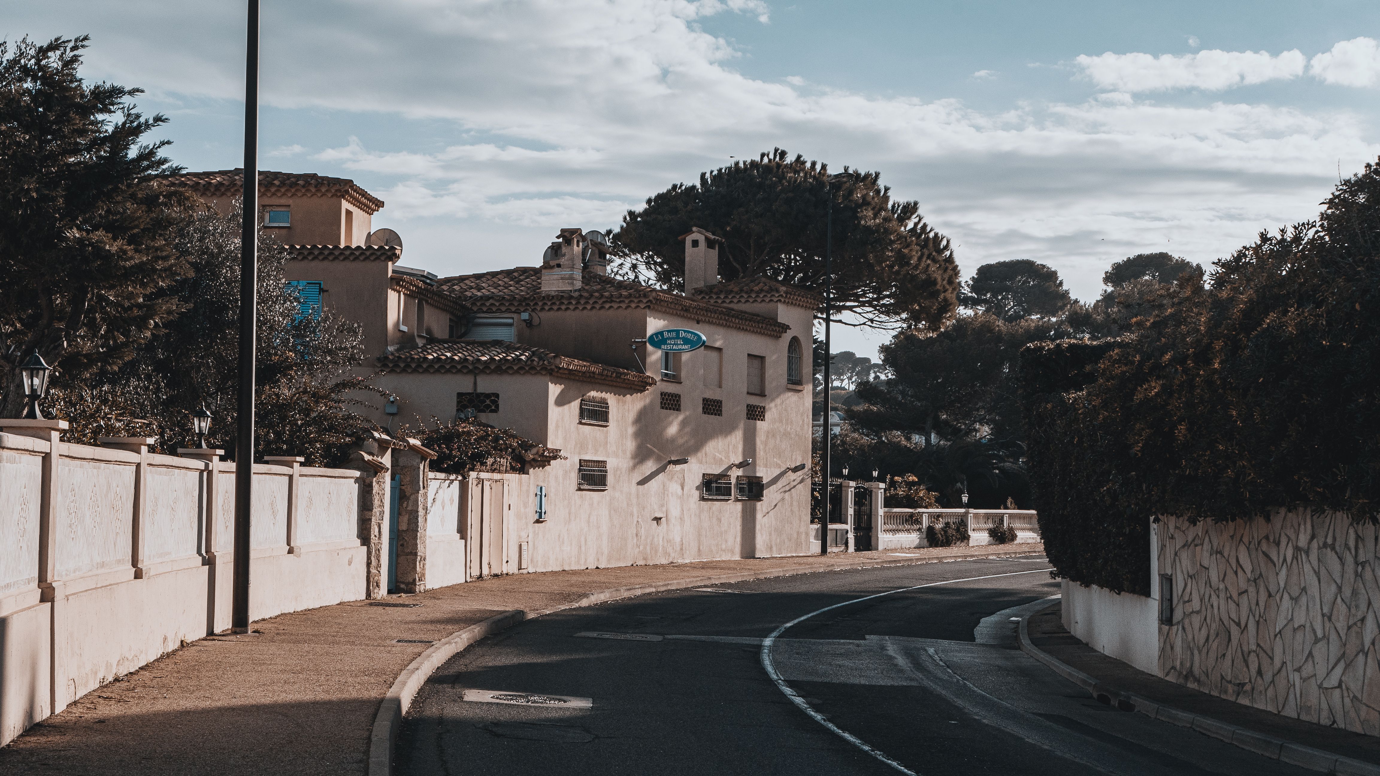 A Street Between Concrete Houses · Free Stock Photo