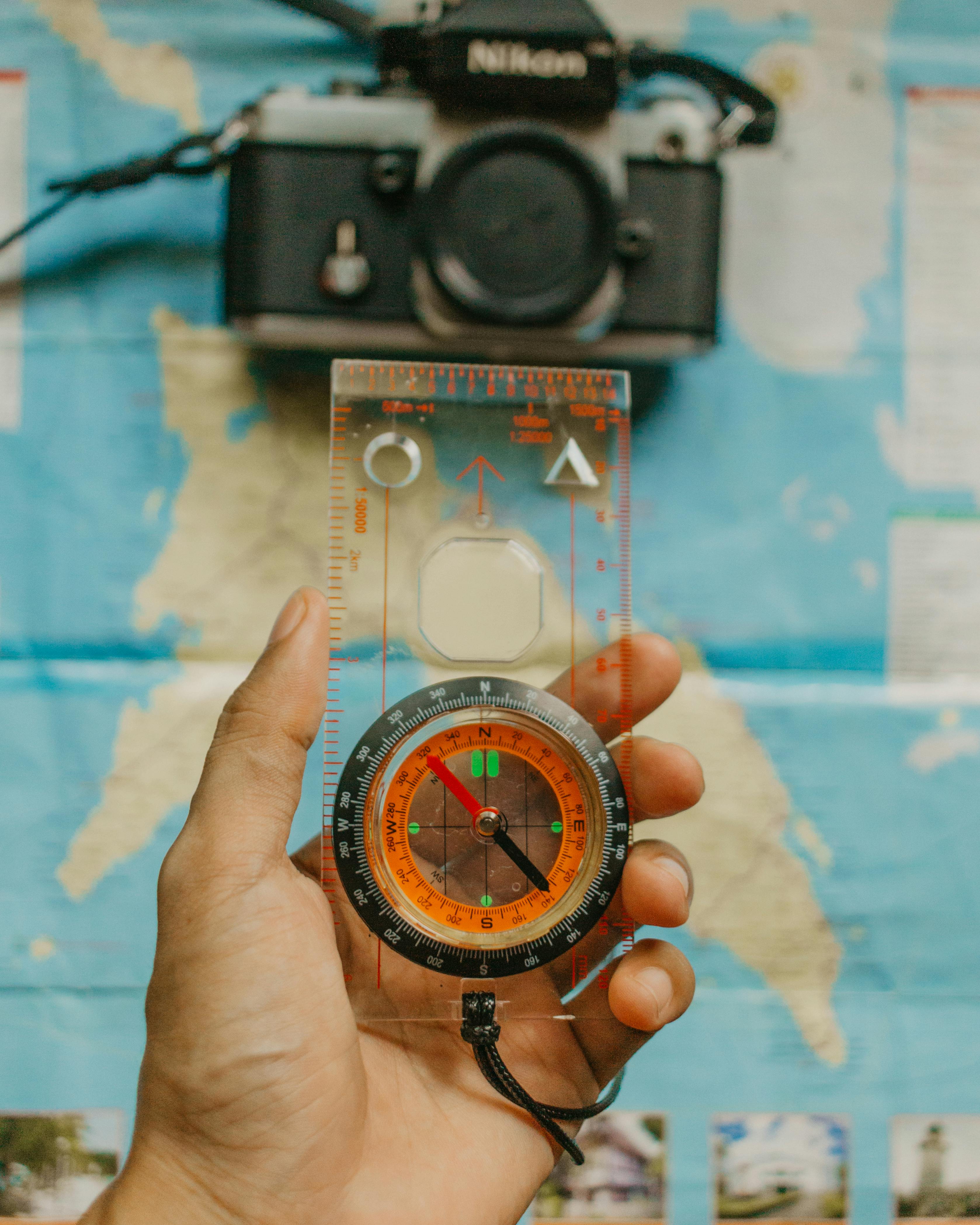 Person Holding a Compass · Free Stock Photo