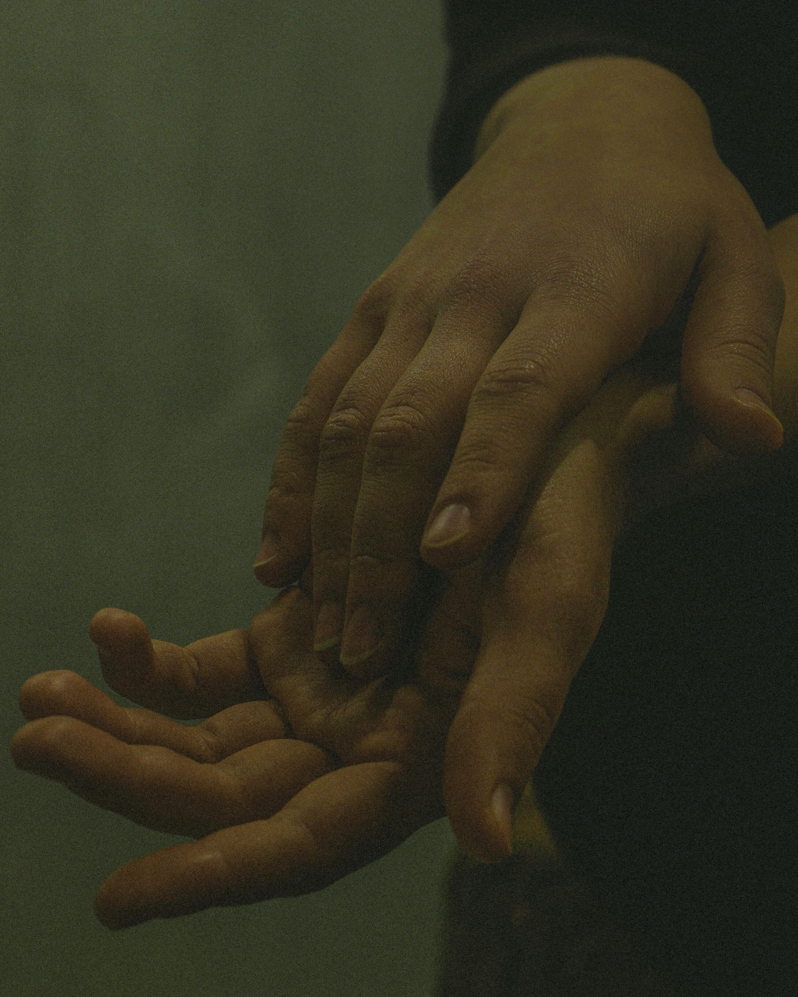 A Couple Touching Hands · Free Stock Photo