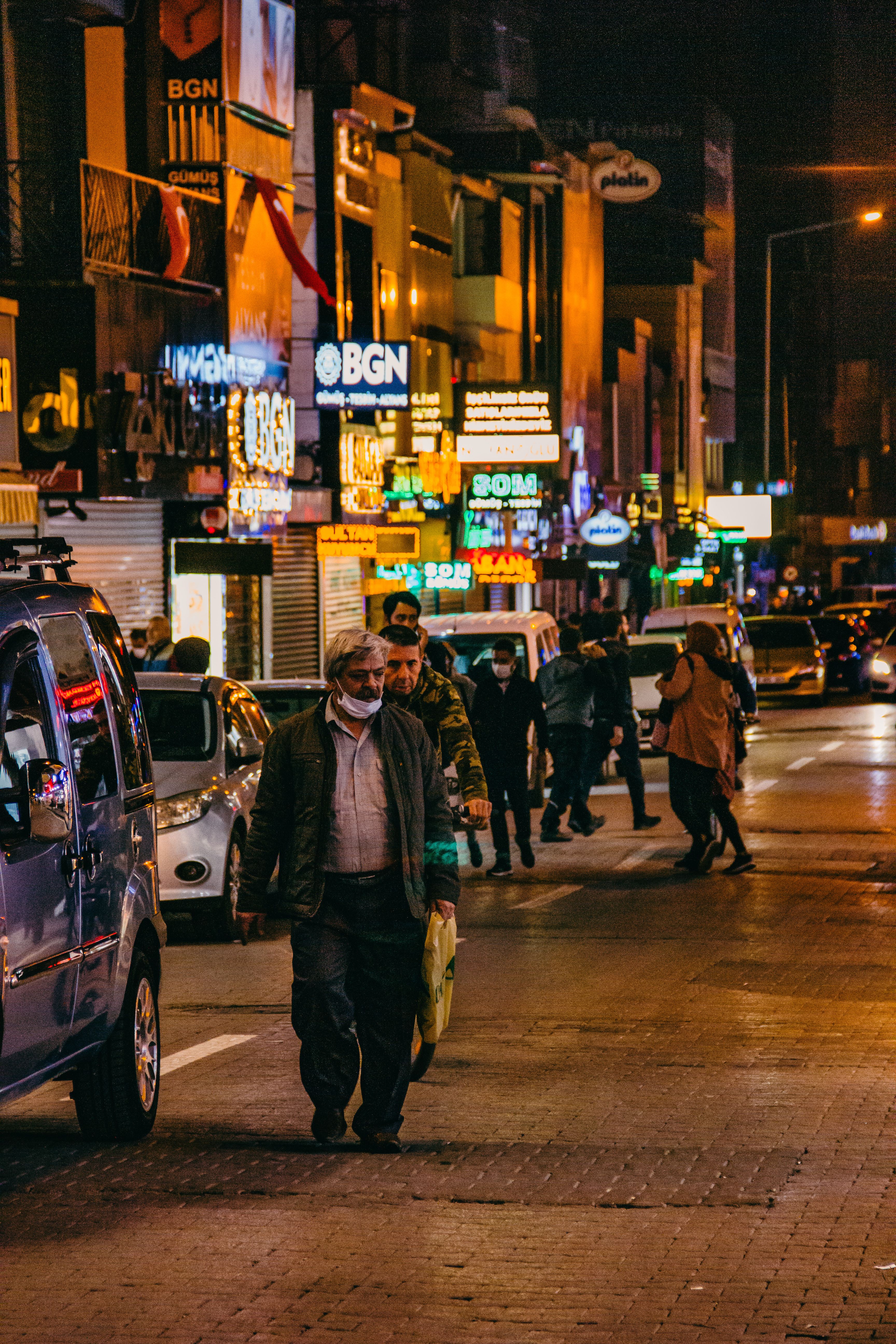 People Walking in Street at Night · Free Stock Photo