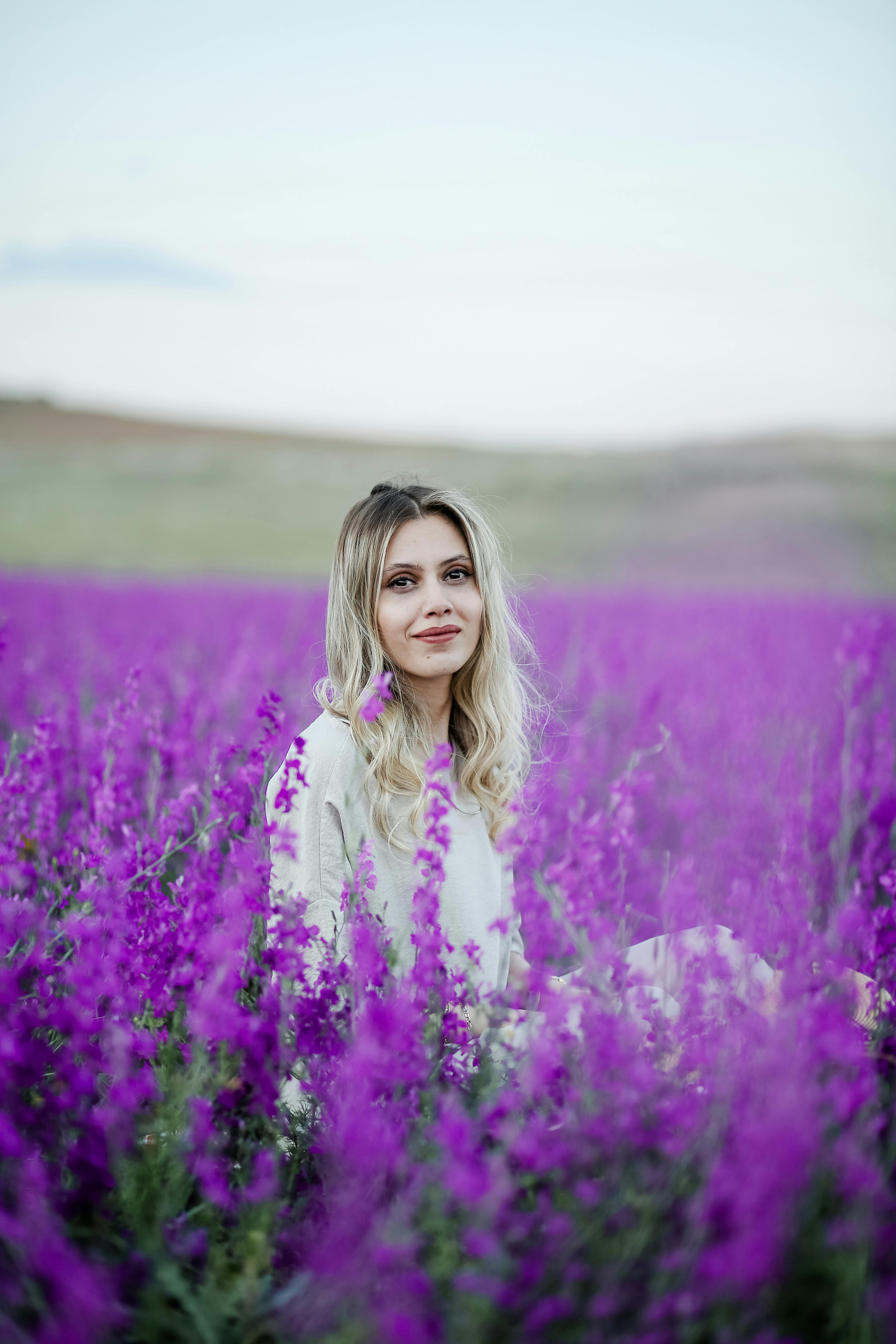 Portrait of a Woman in a Flower Field · Free Stock Photo