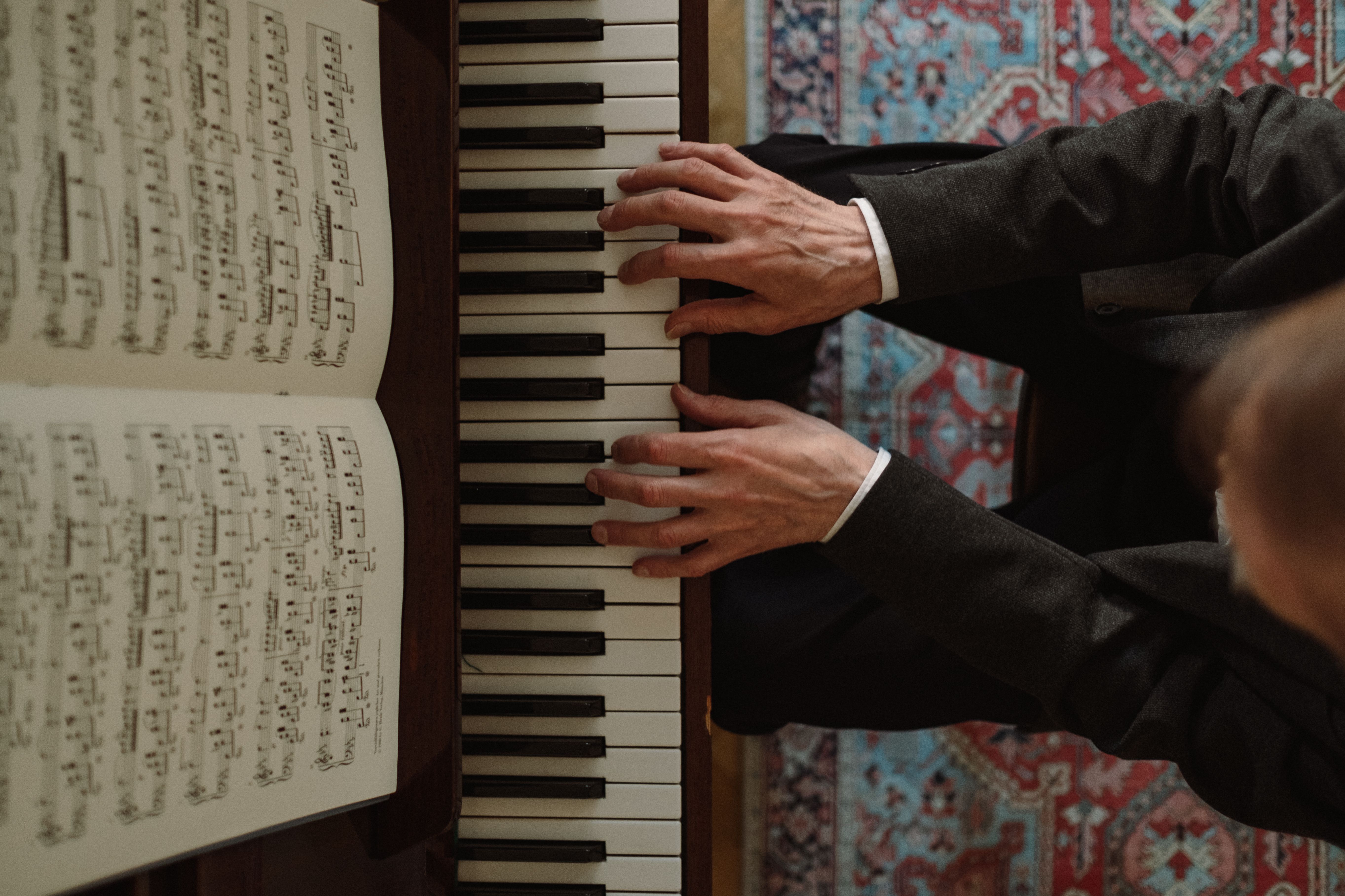 Overhead Shot of a Person Playing the Piano · Free Stock Photo