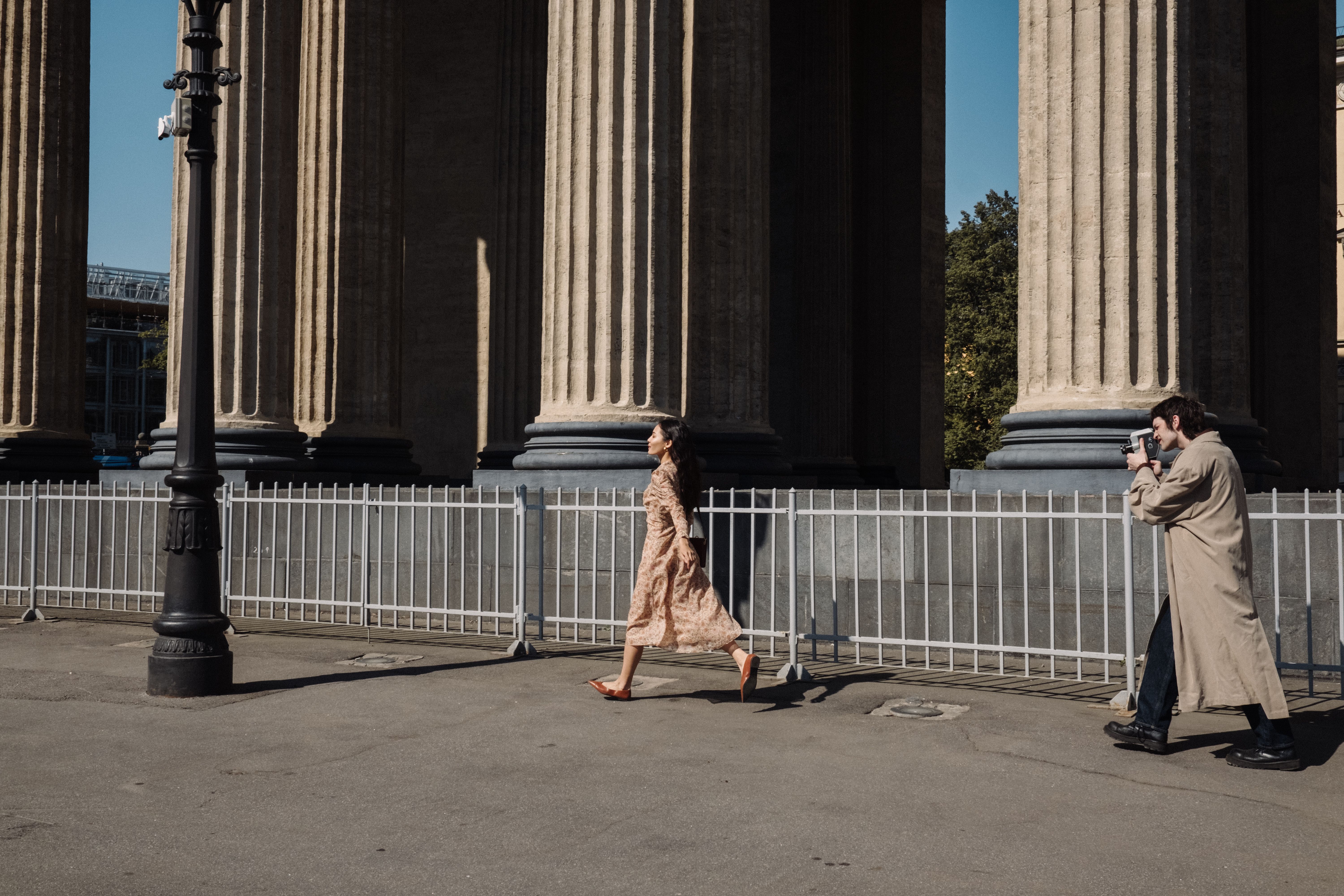 Man Filming a Woman while Holding Hands · Free Stock Photo