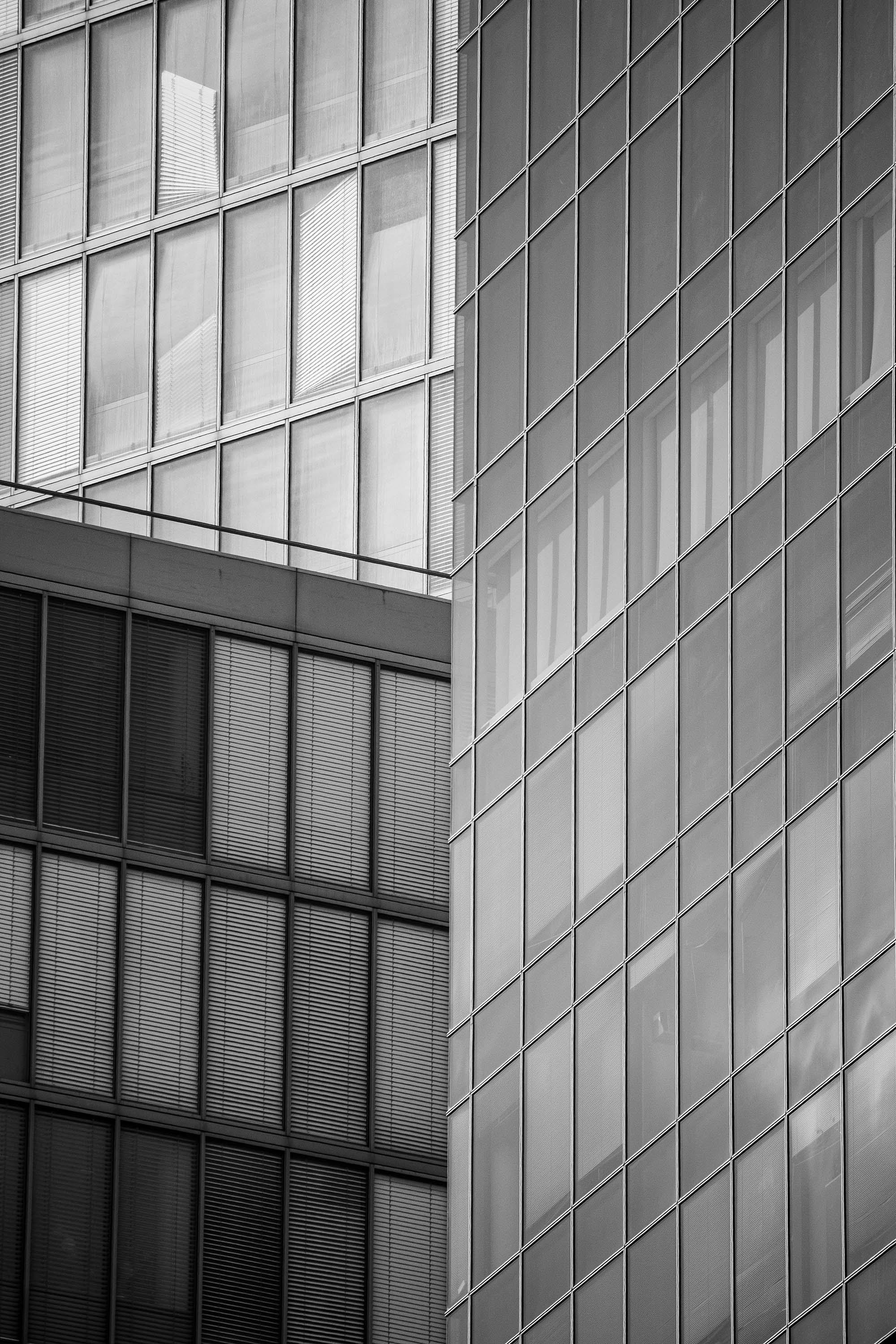 Black and White Photo of a Glass Building · Free Stock Photo