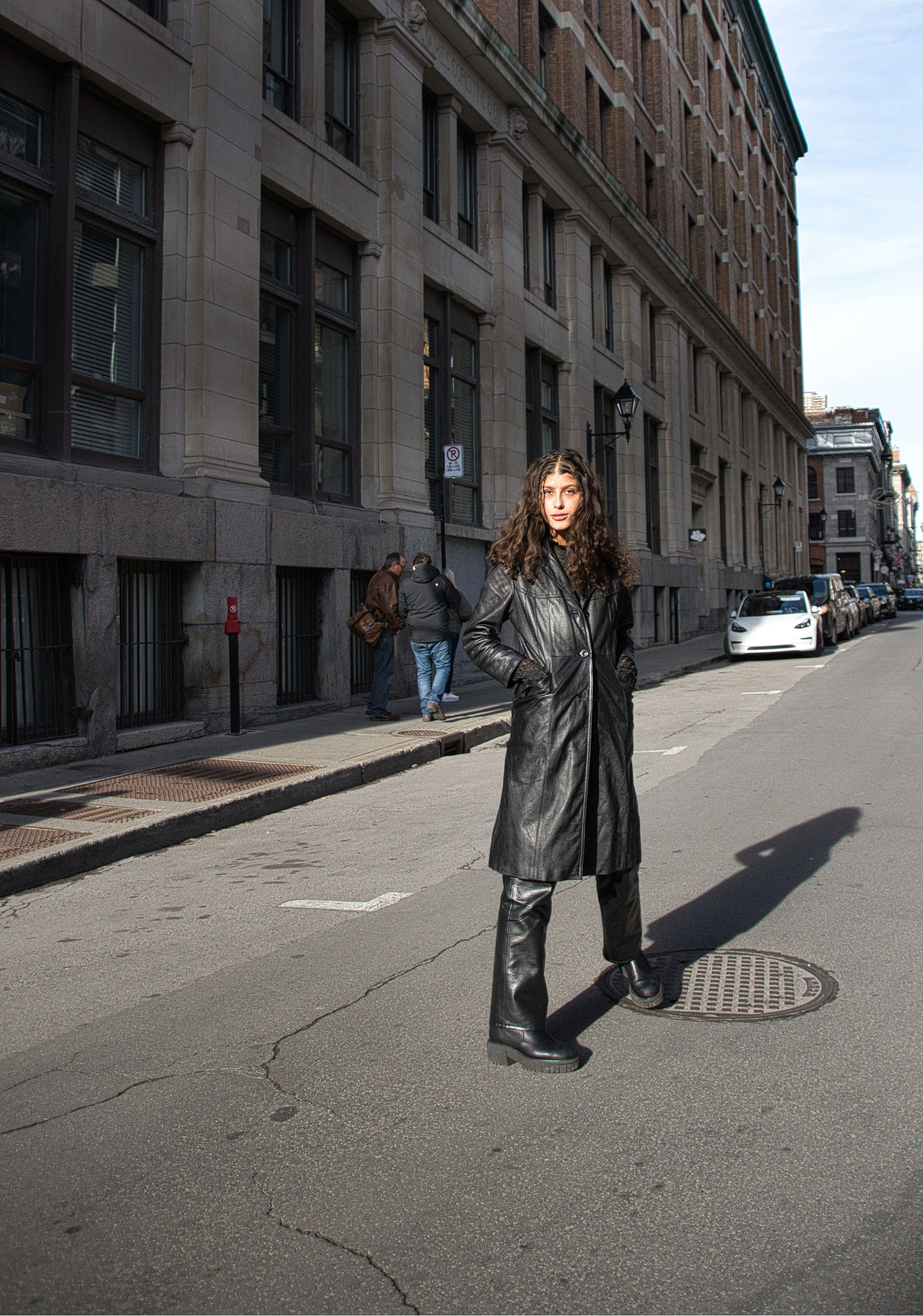 Woman in Black Leather Coat Standing on the Street · Free Stock Photo