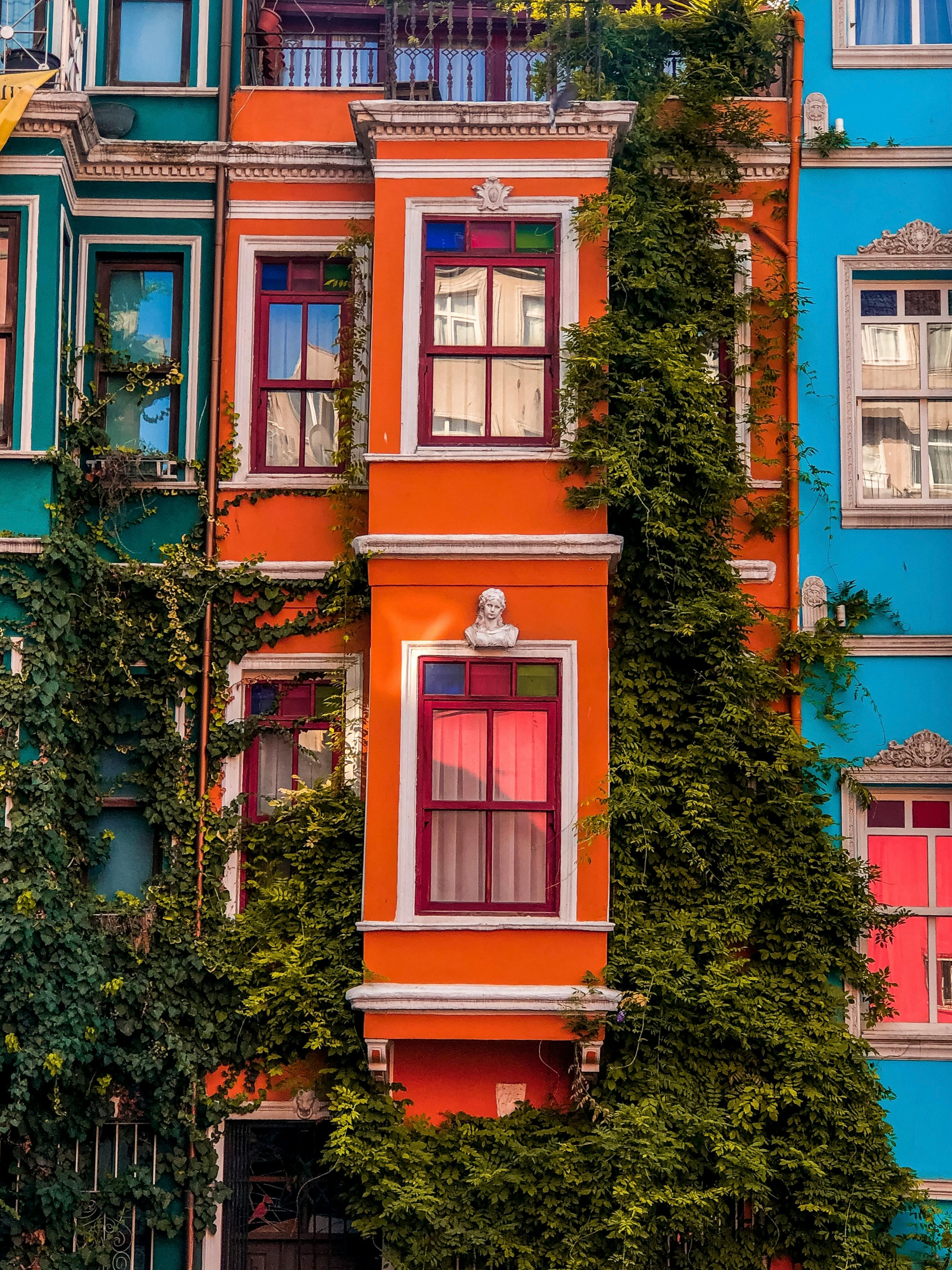 Windows of Colorful Residential Building · Free Stock Photo