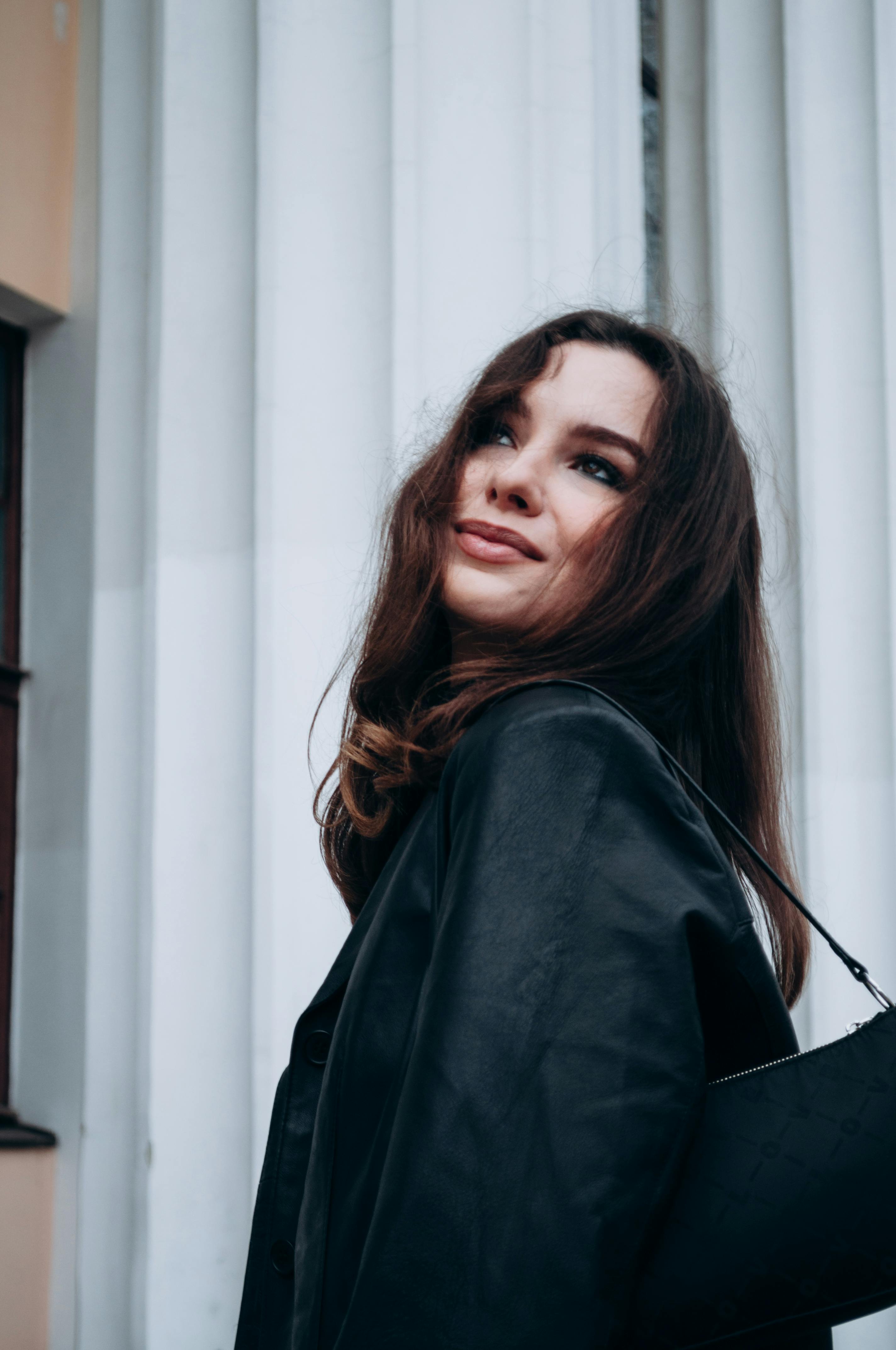Woman Standing Between Trees · Free Stock Photo