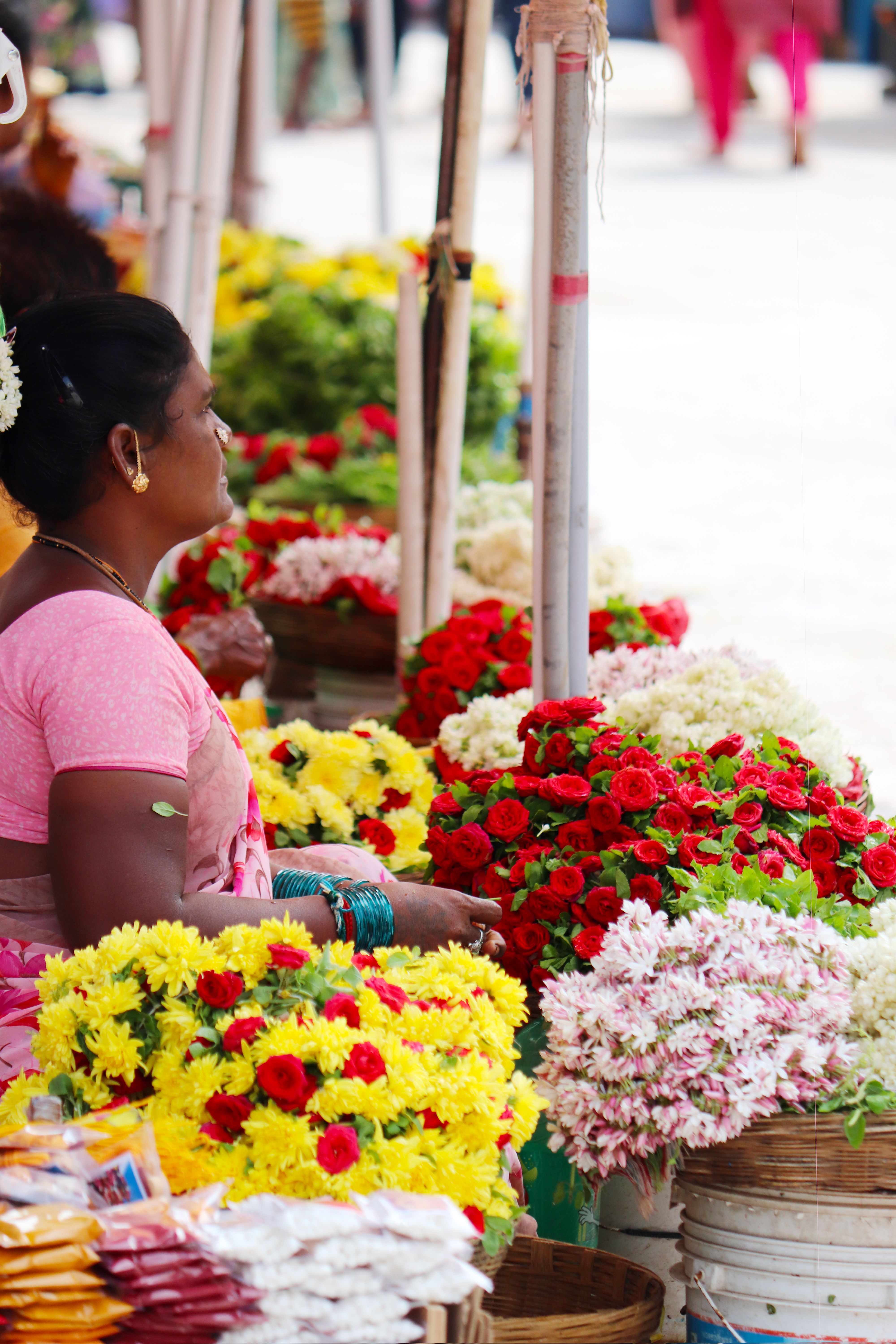 A Woman Selling Flowers · Free Stock Photo