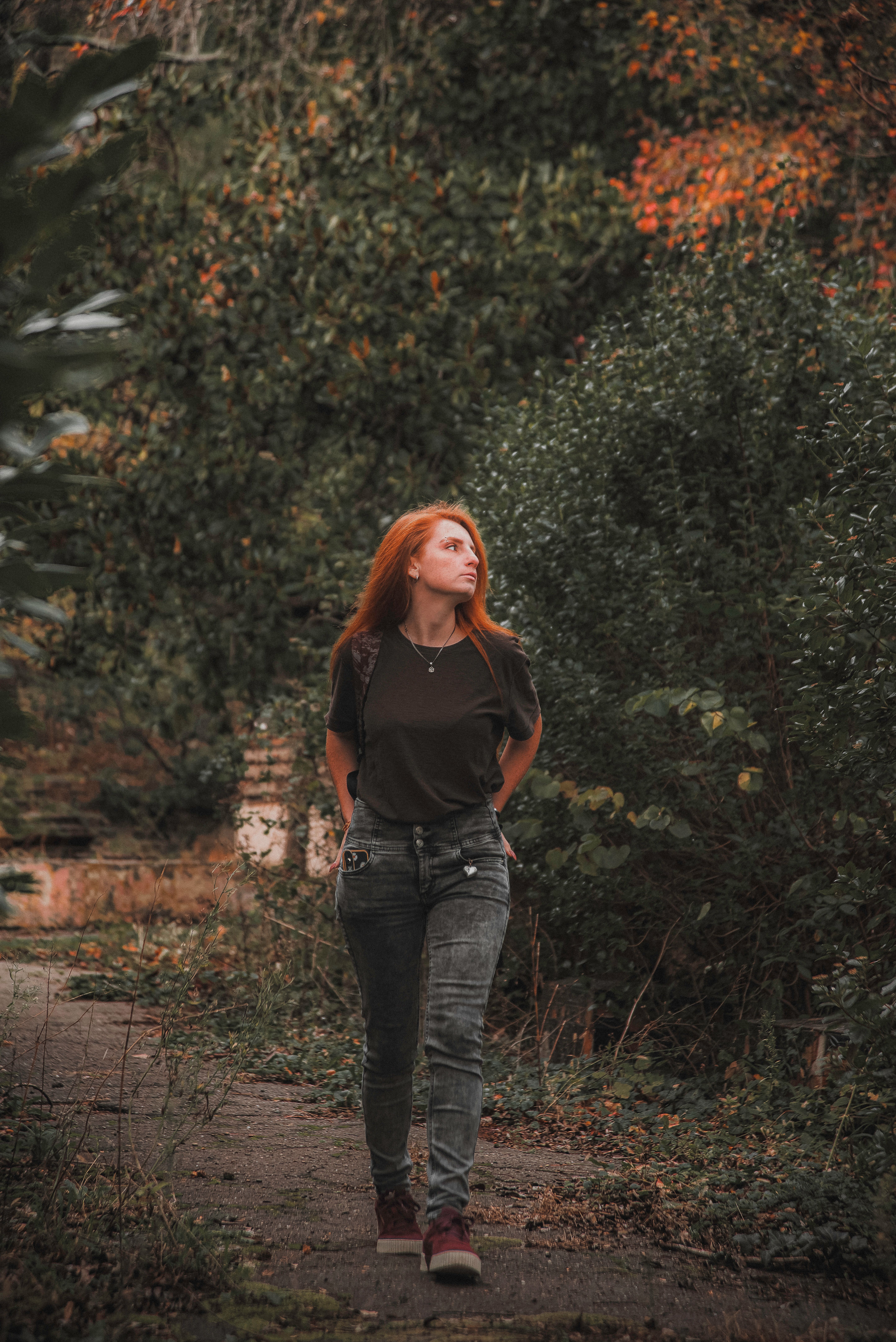 A Beautiful Woman Walking on Sidewalk · Free Stock Photo