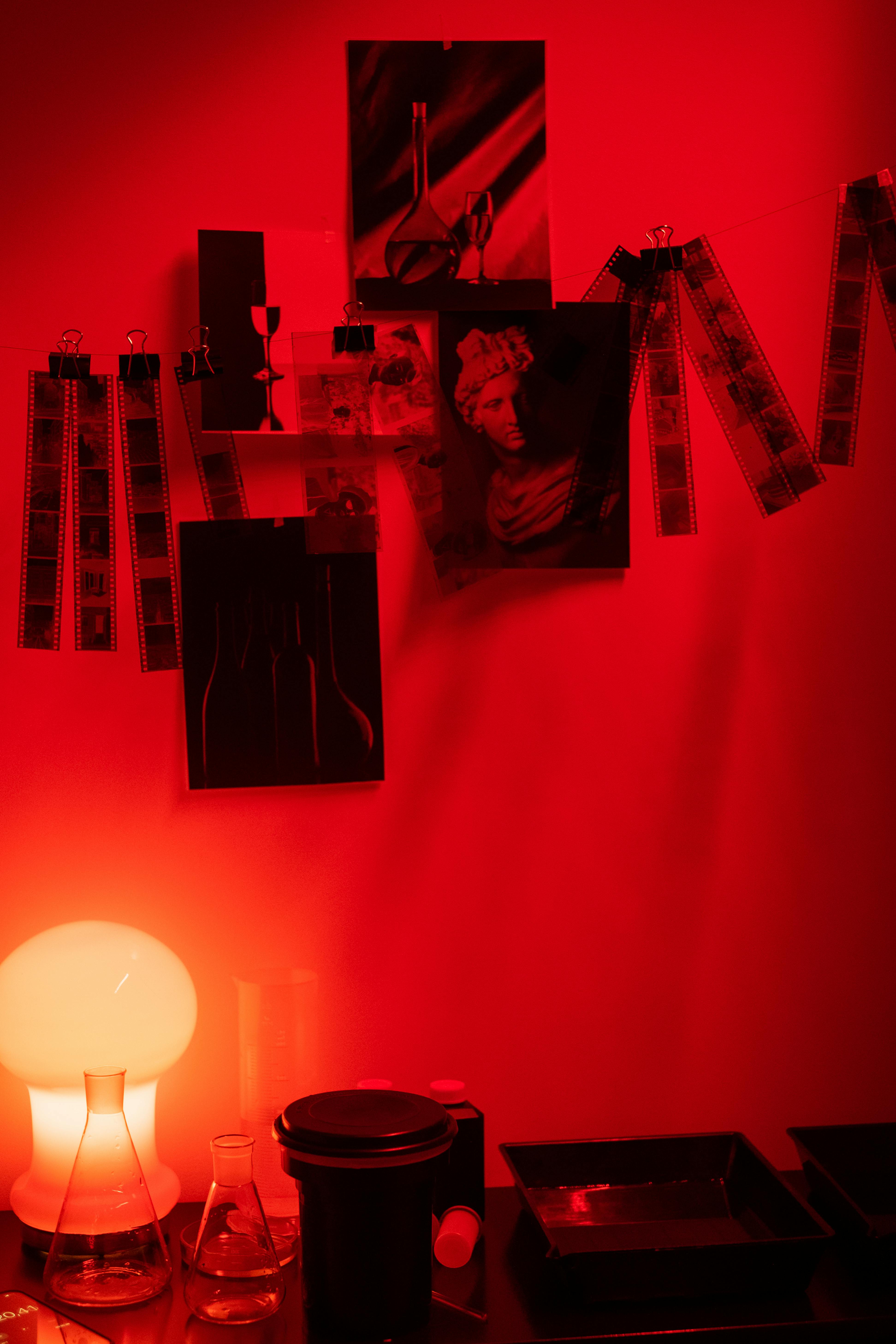 Pictures and Pieces of Camera Film Hanging and Drying in Darkroom ...