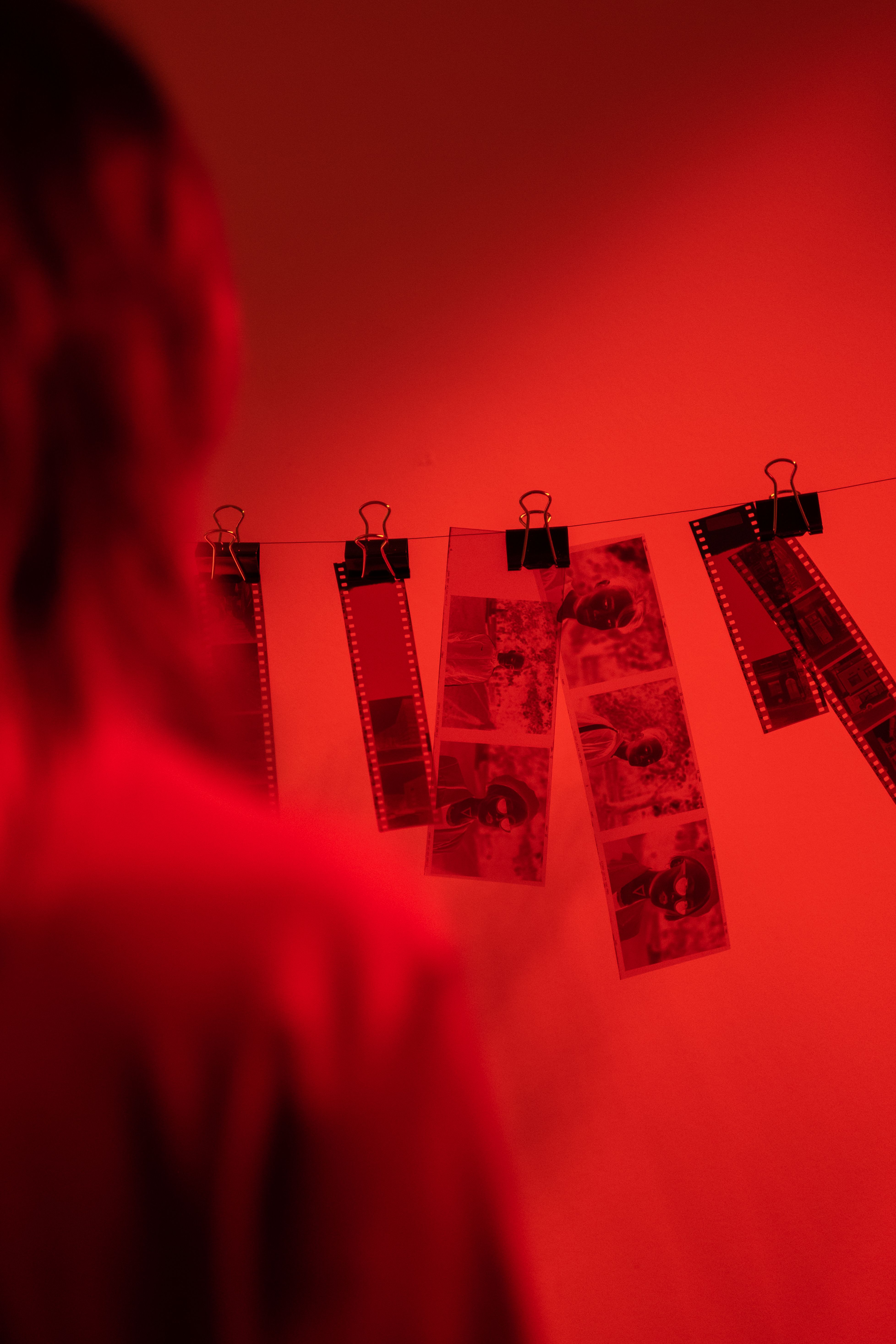 Person Developing Film in a Dark Room · Free Stock Photo