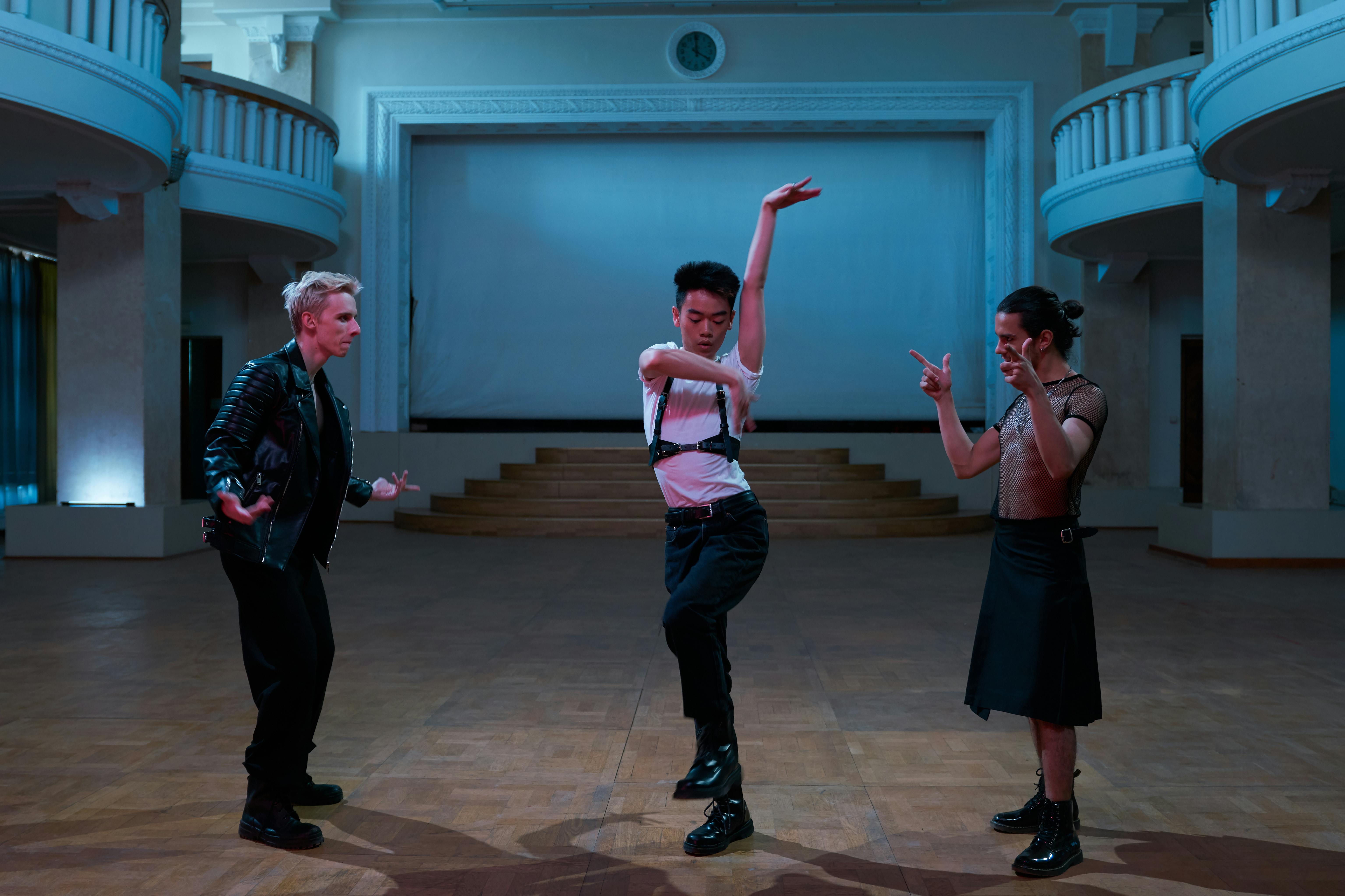 Two People Dancing Tango on Concrete Floor · Free Stock Photo