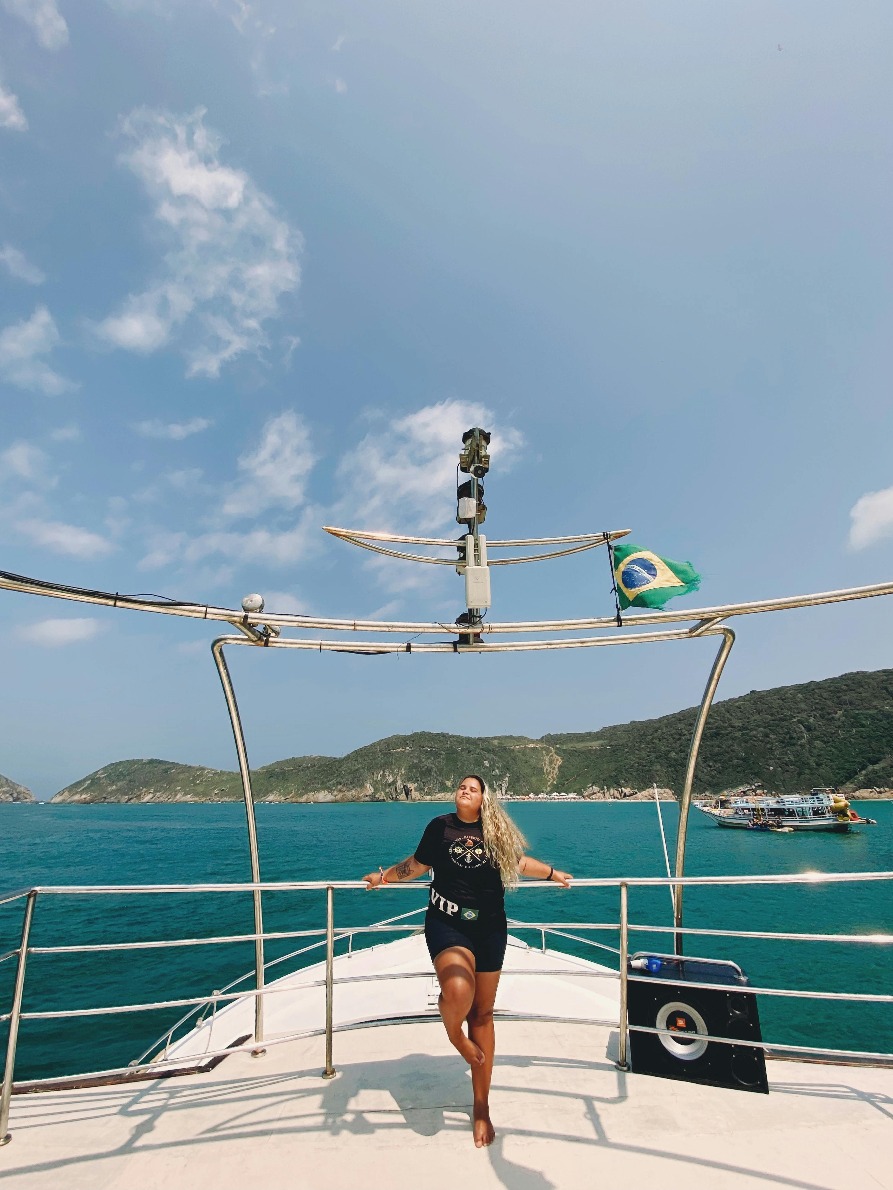 Woman in Dark Clothing in Red Light · Free Stock Photo