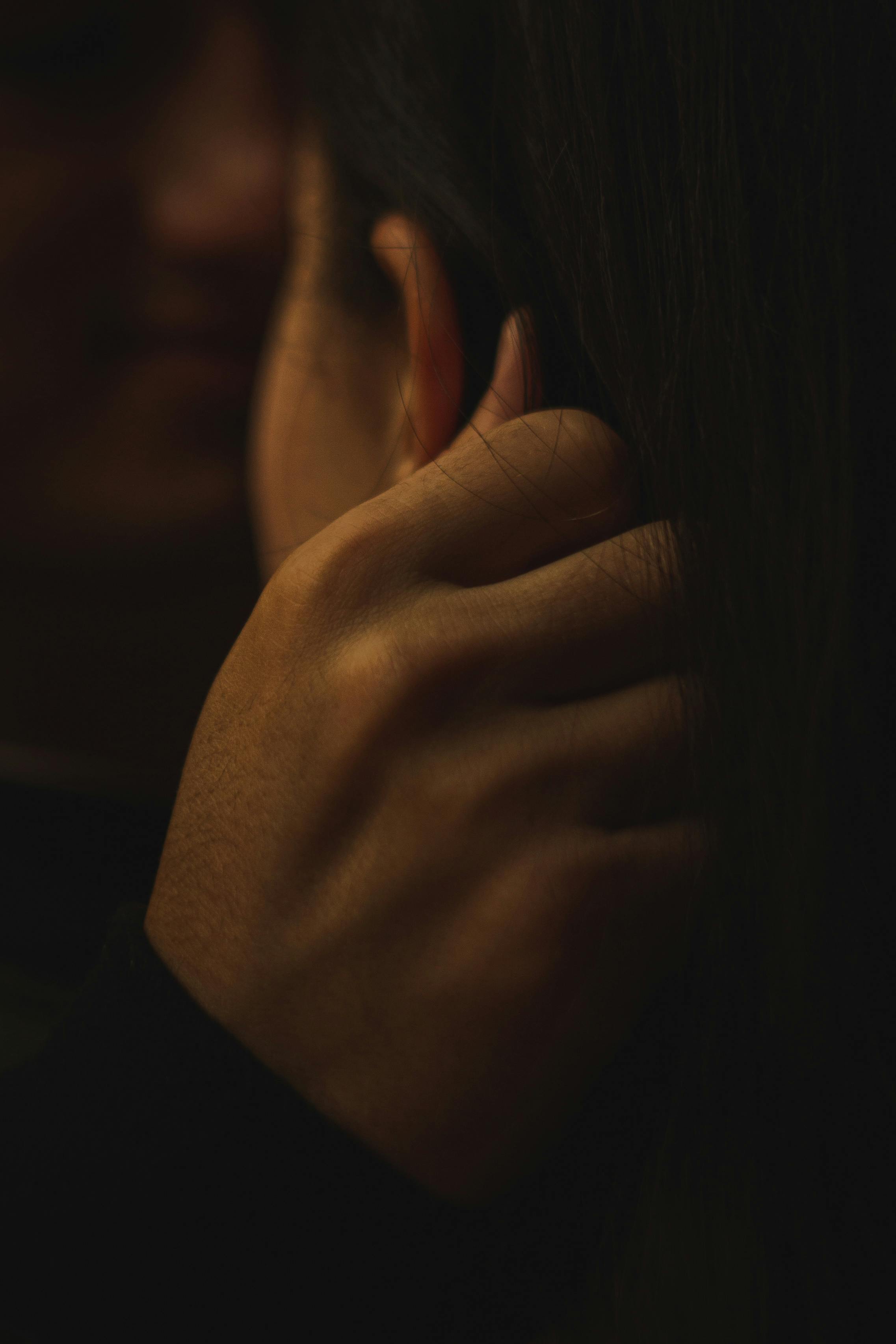 Close-Up Photo of a Person's Ear · Free Stock Photo