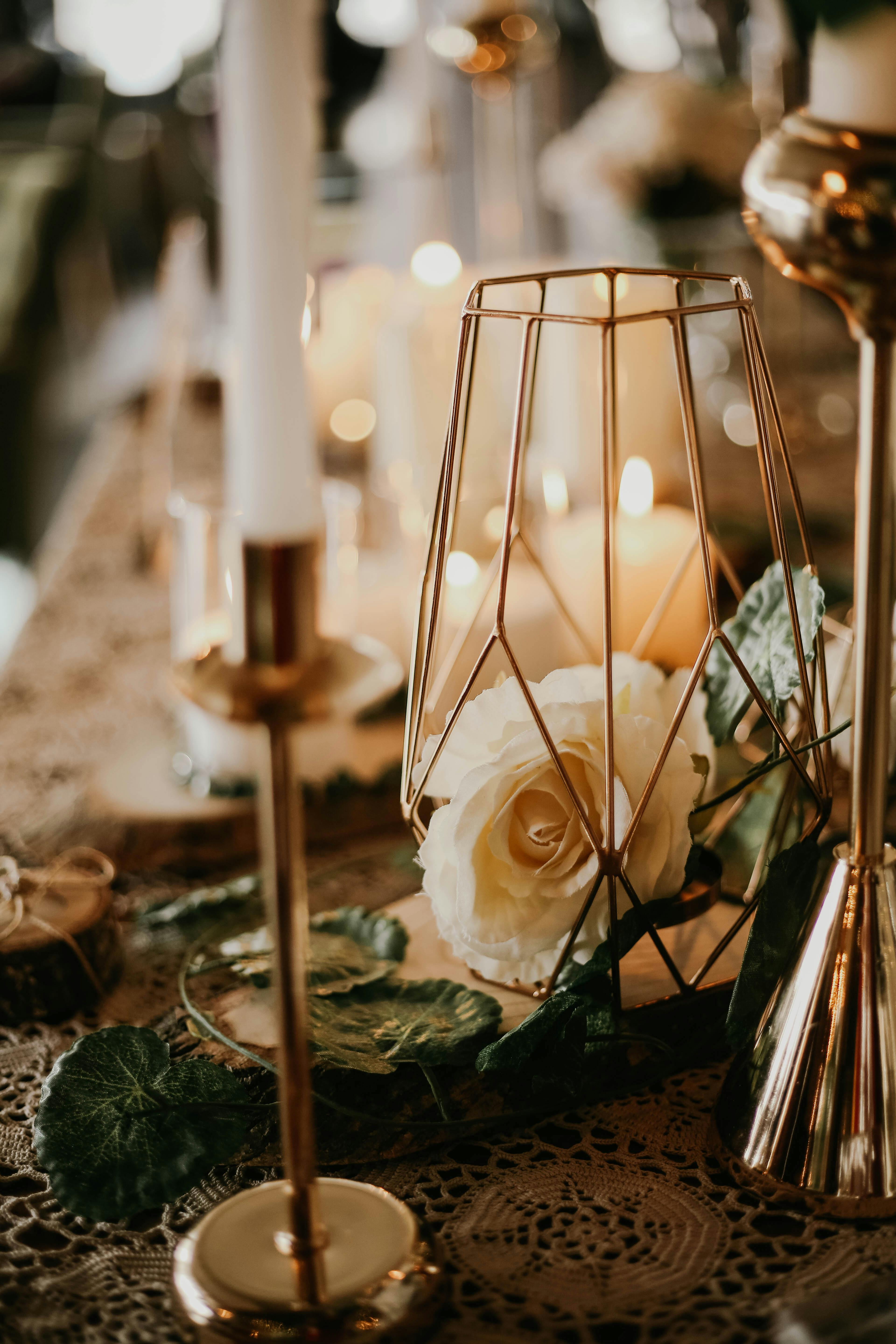 Flowers and Decorations around Table · Free Stock Photo
