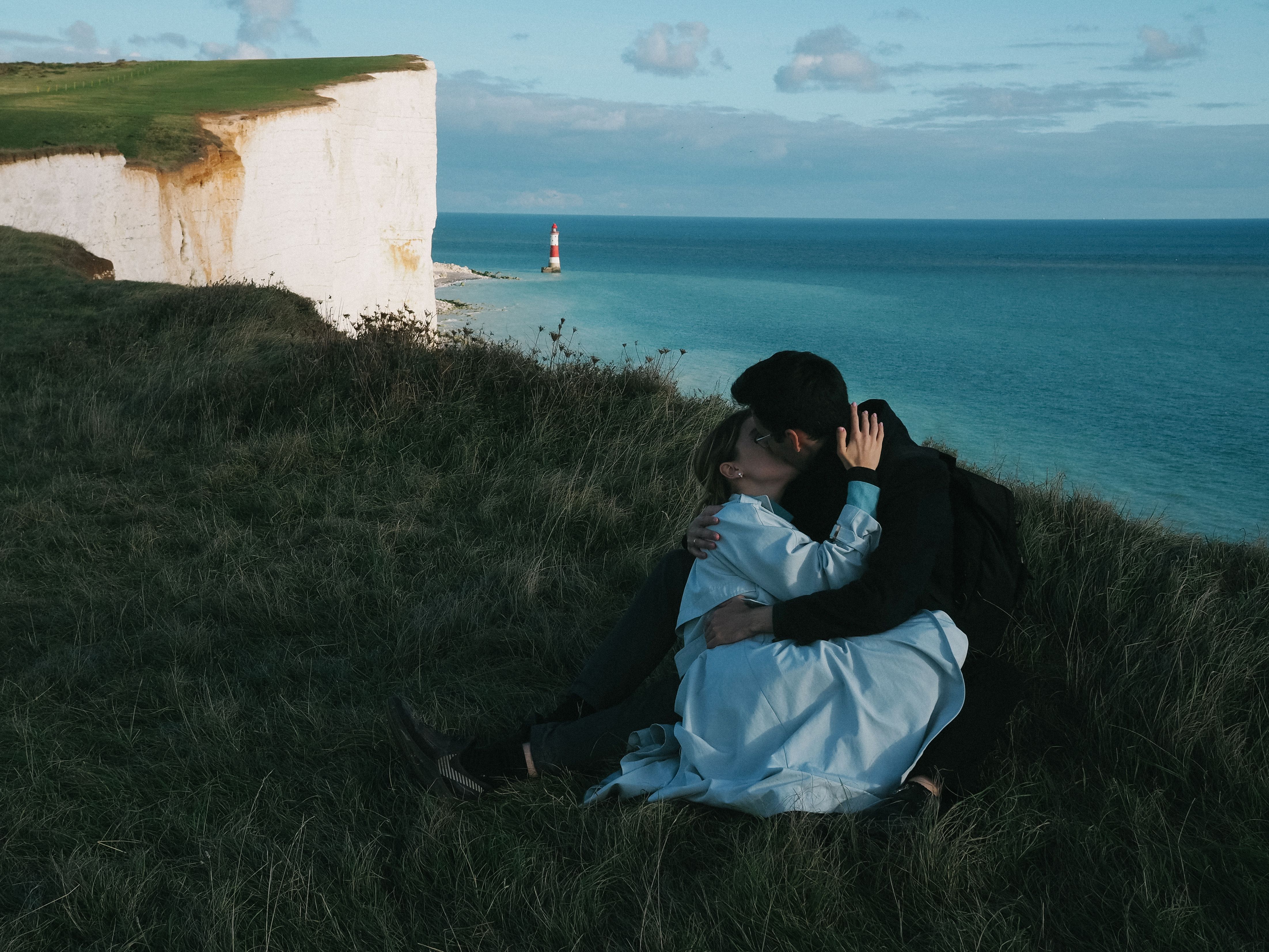 A Couple Kissing while on the Cliff · Free Stock Photo