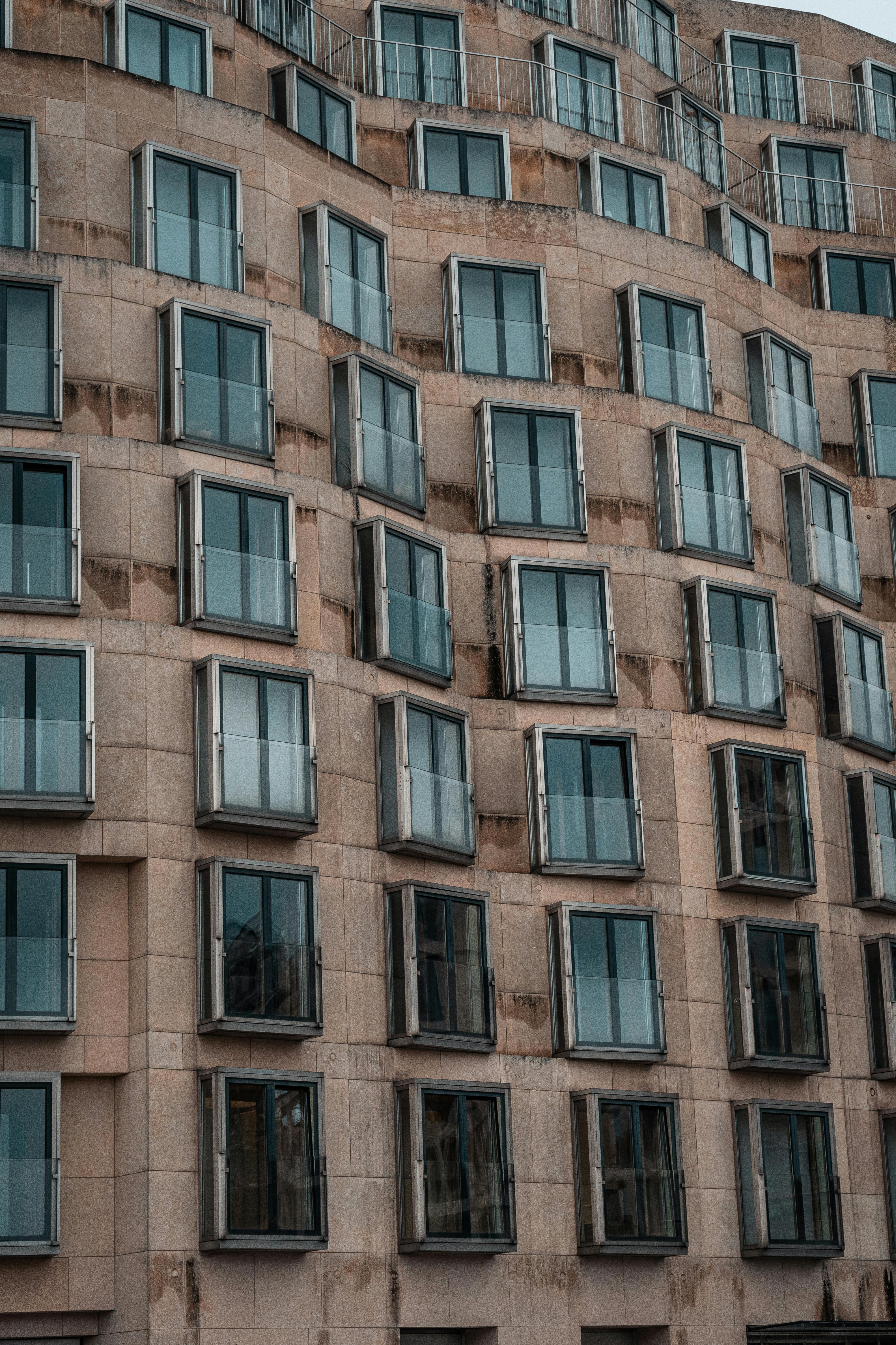 Architectural Photography of Beige Buildings · Free Stock Photo