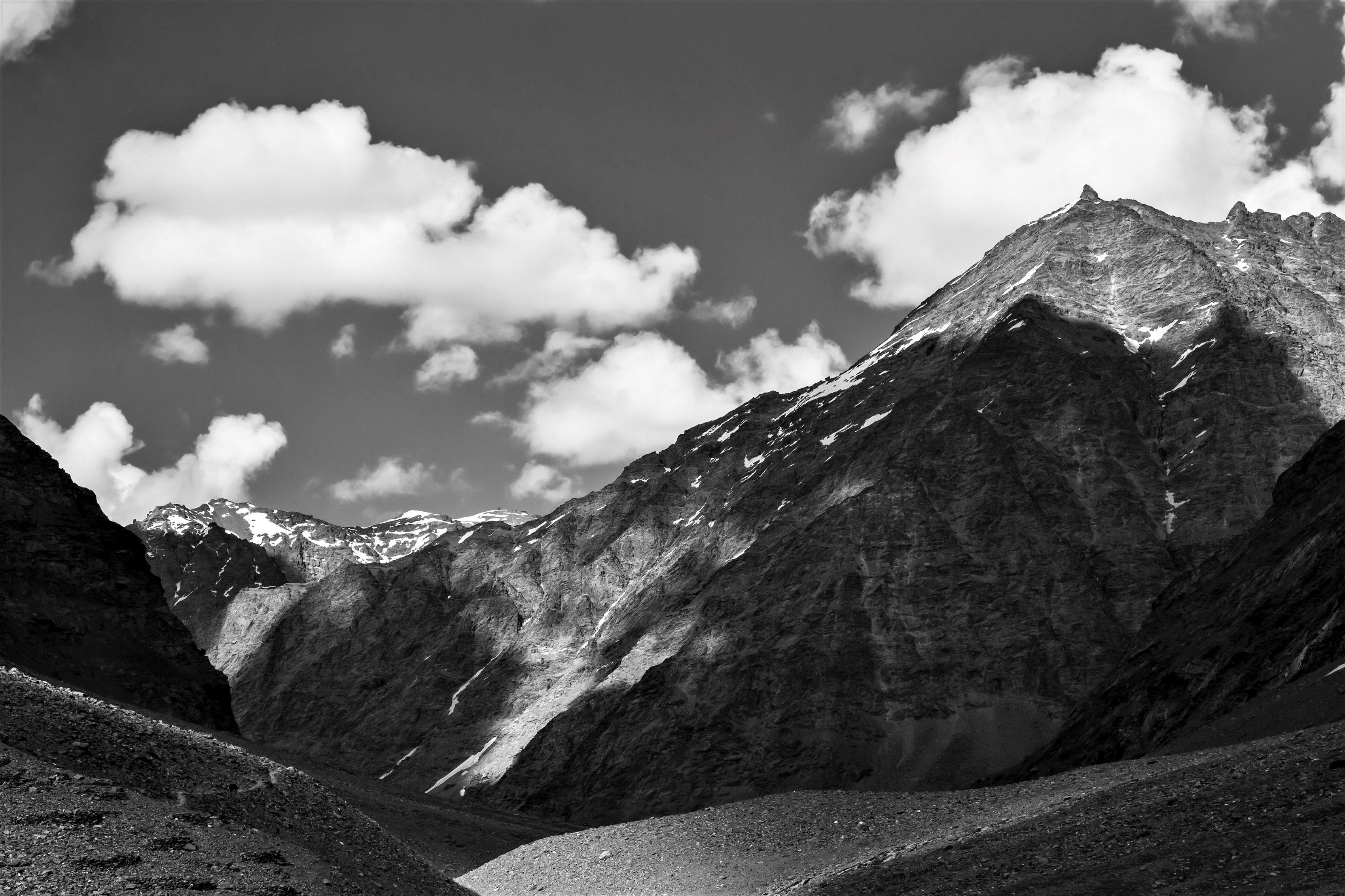 Grayscale Photo of Mountain Range · Free Stock Photo