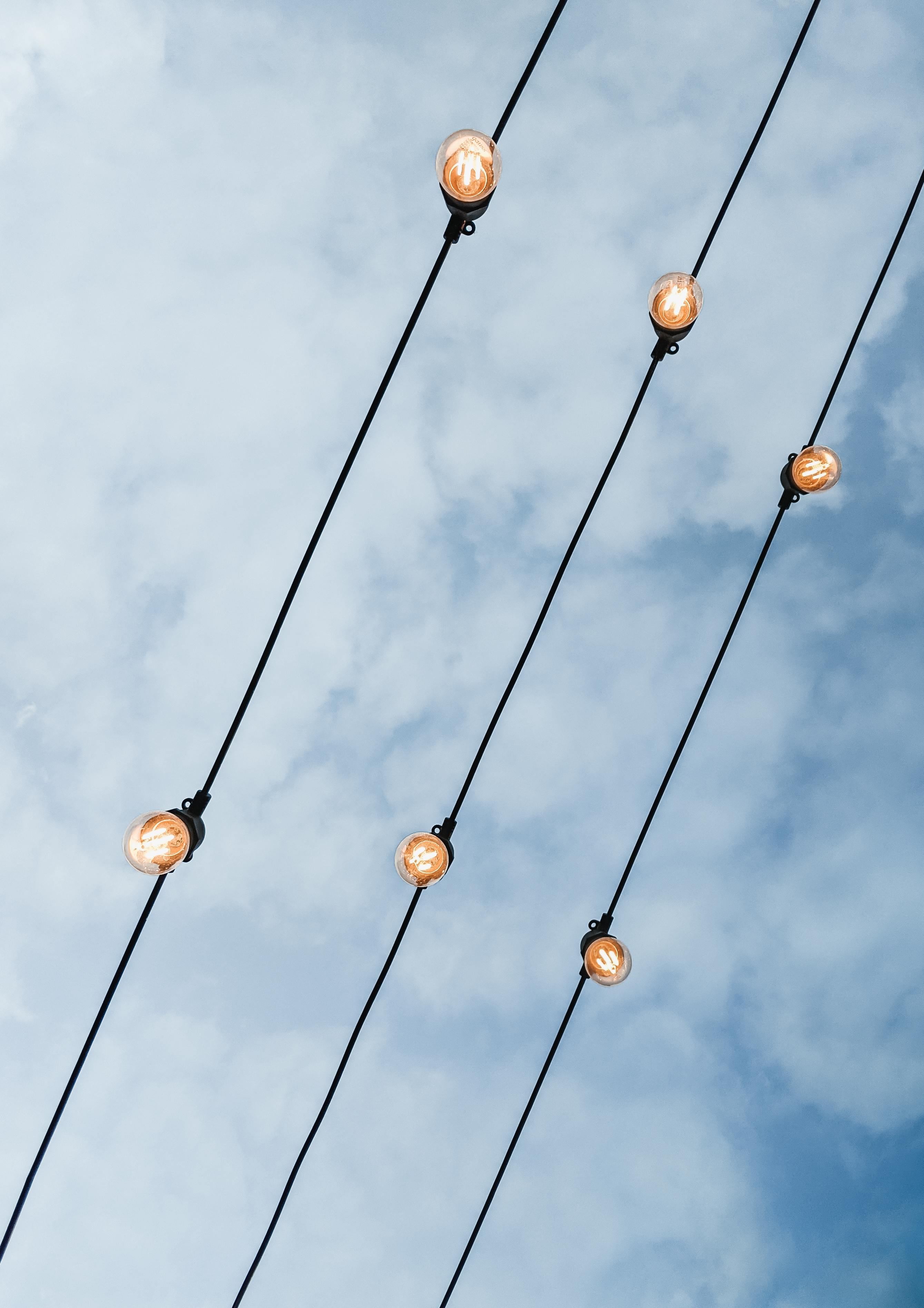 String Light Bulbs Under the Blue Sky · Free Stock Photo