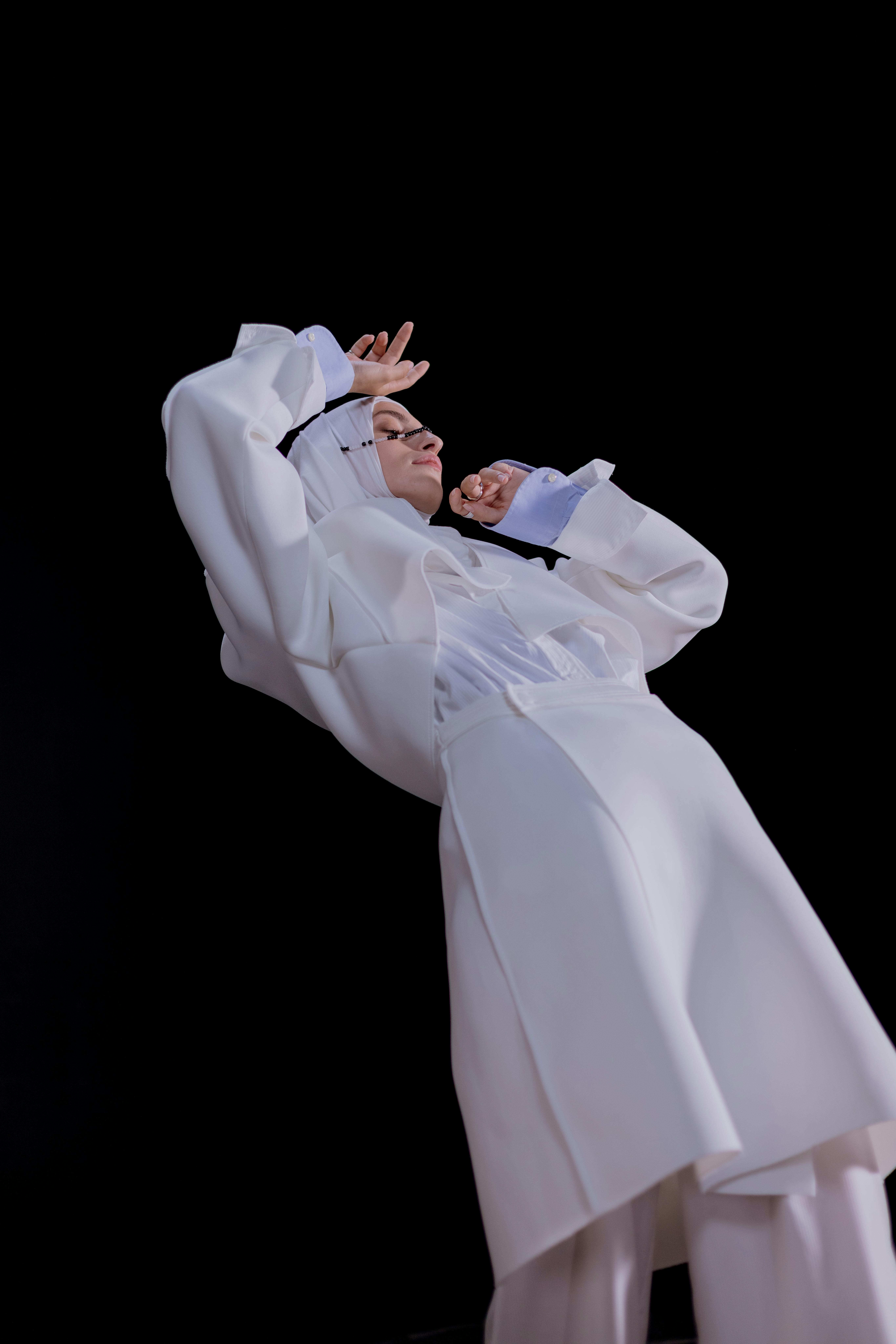 Woman in White Traditional Wear · Free Stock Photo