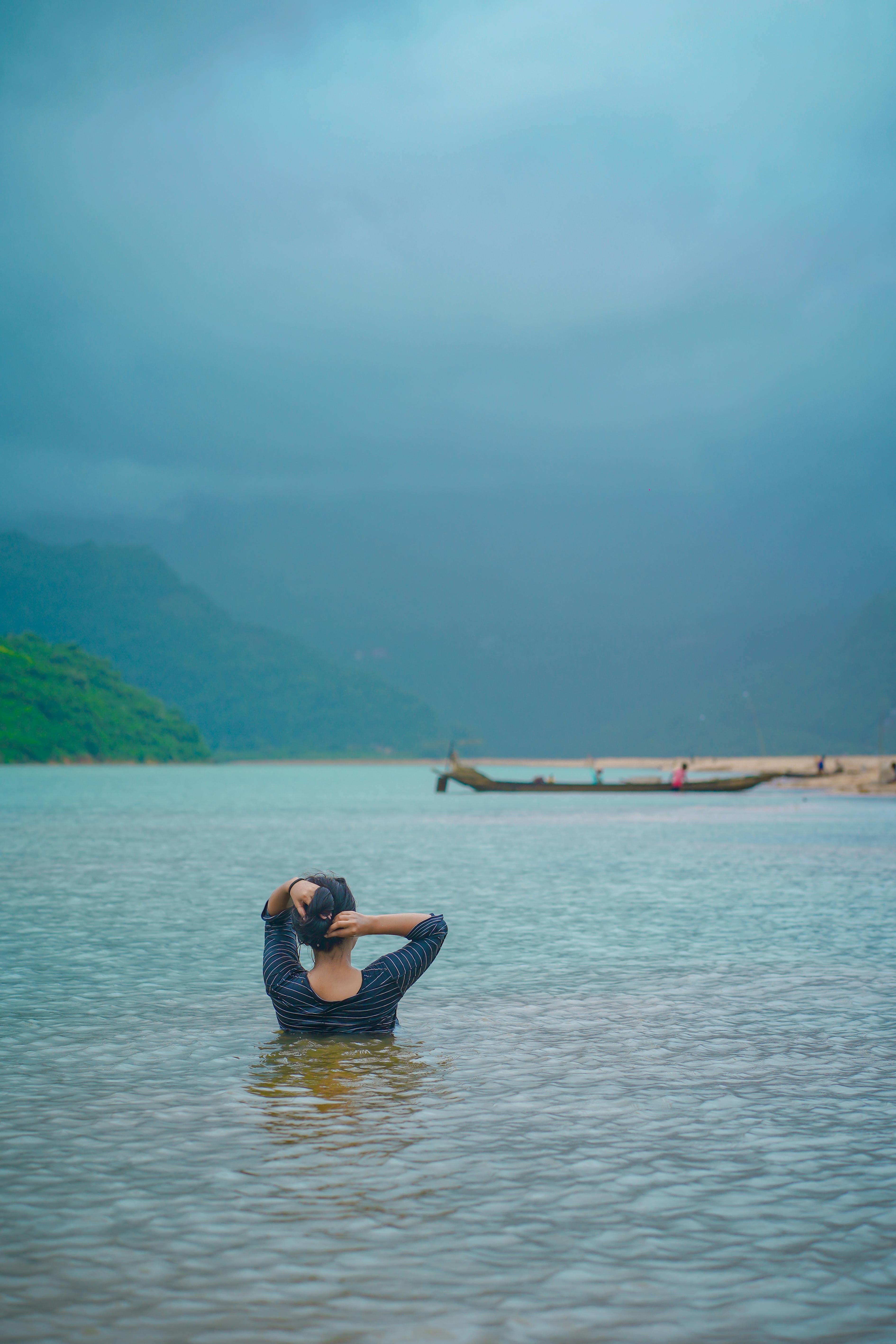 Woman Standing in Sea · Free Stock Photo