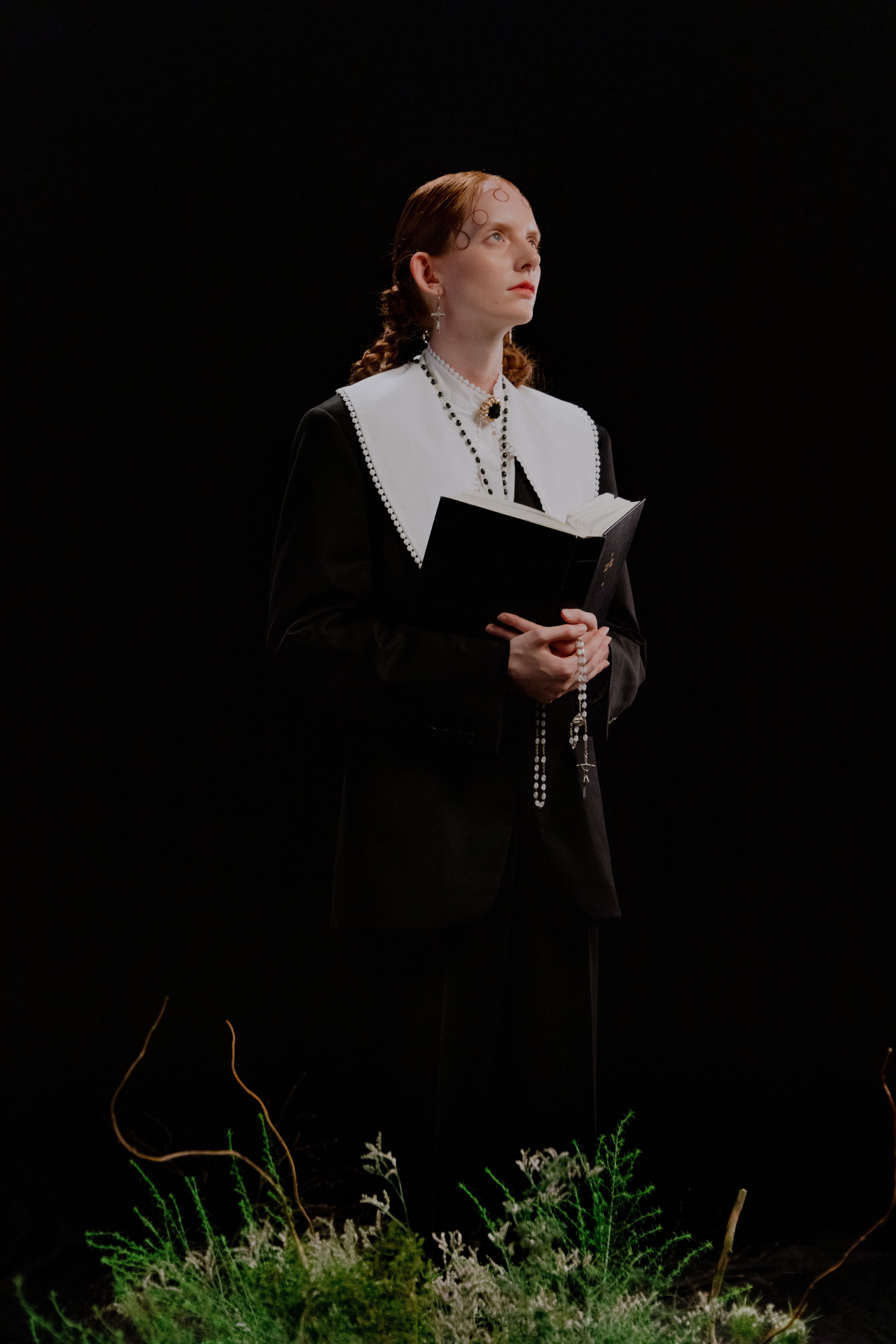 Nun Standing with Book · Free Stock Photo