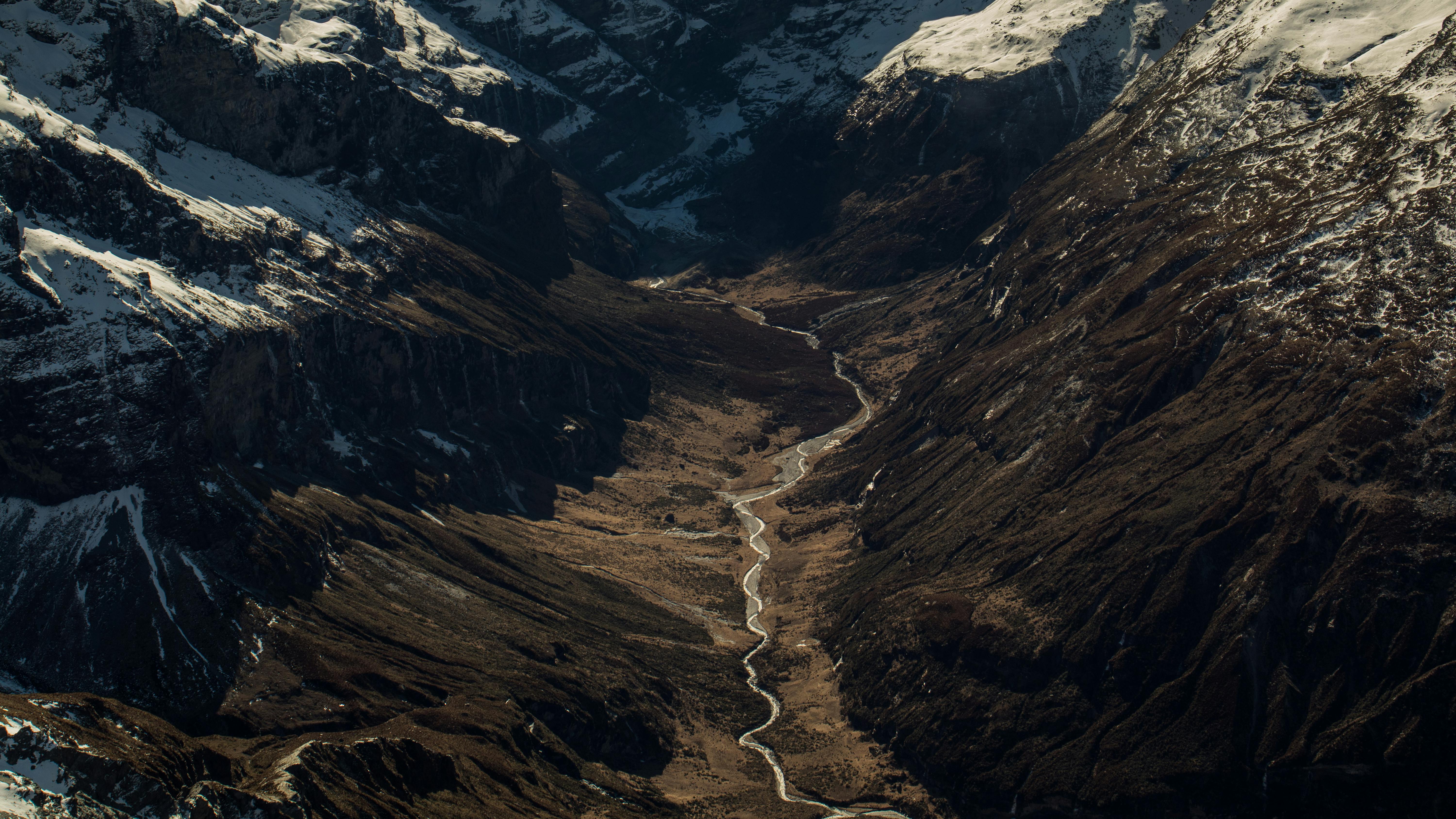 River in Between Mountains · Free Stock Photo