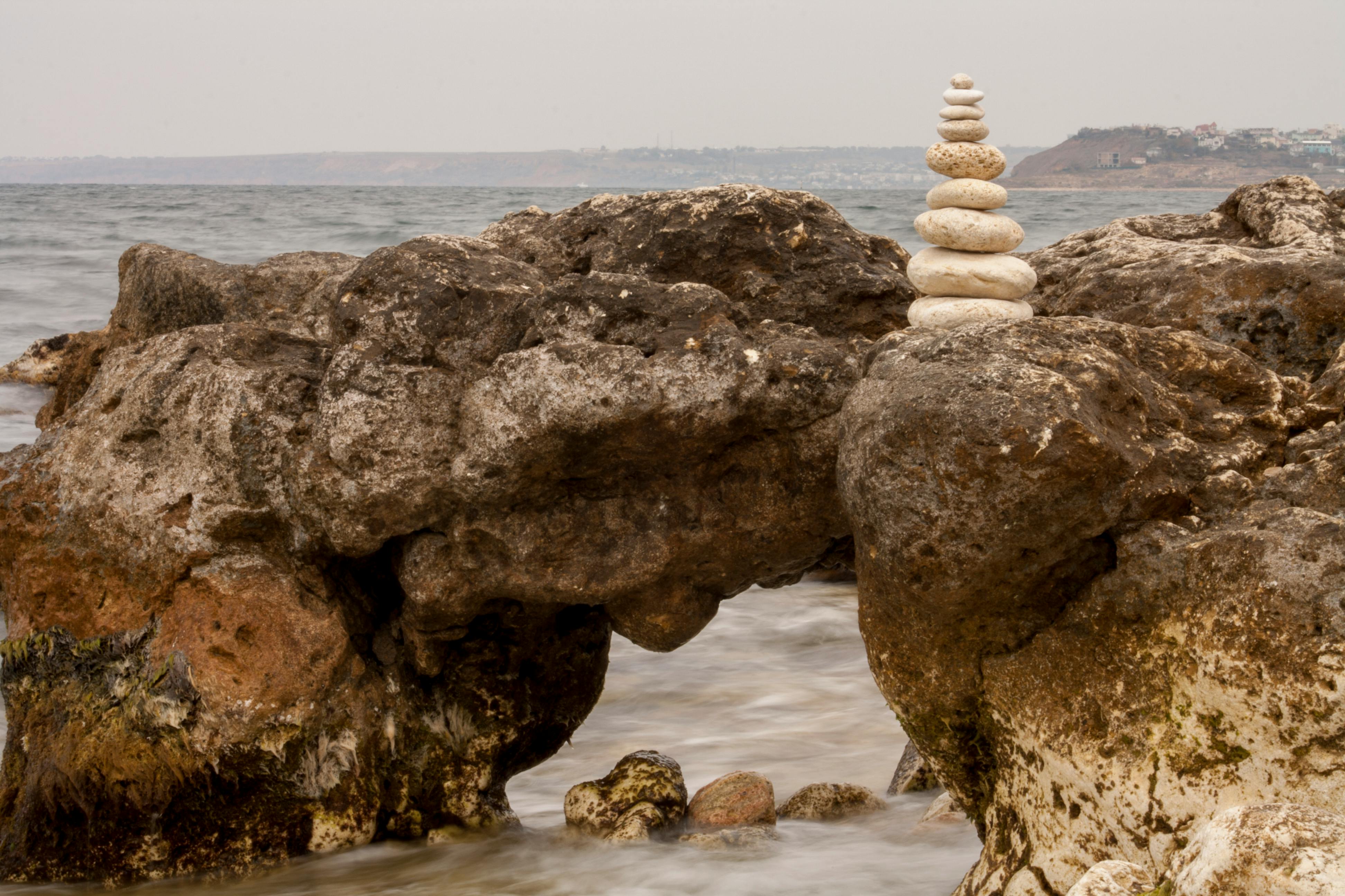 Brown Rock Formation on Sea Shore · Free Stock Photo
