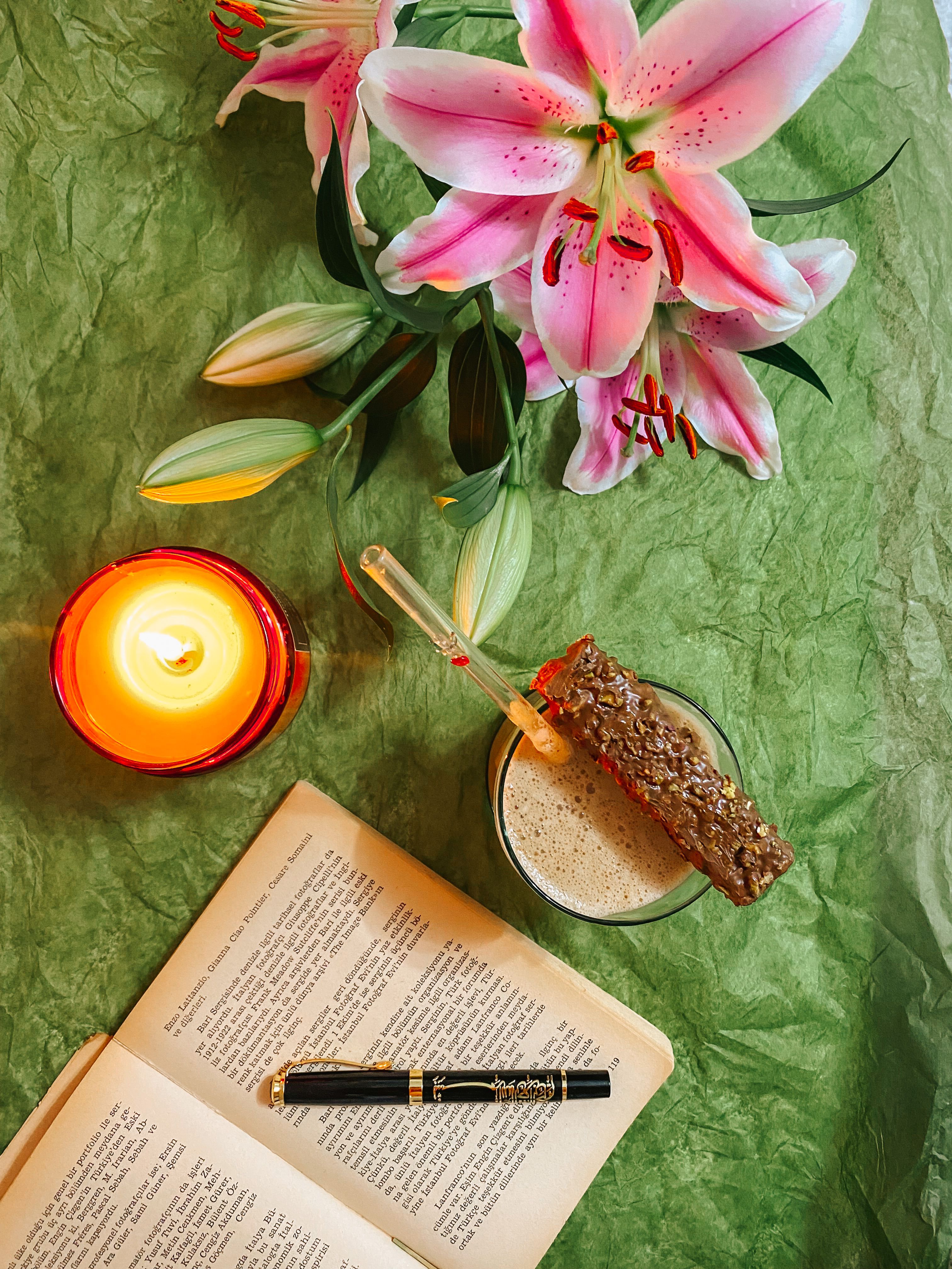 Top View of a Stargazer with Candle on the Table · Free Stock Photo
