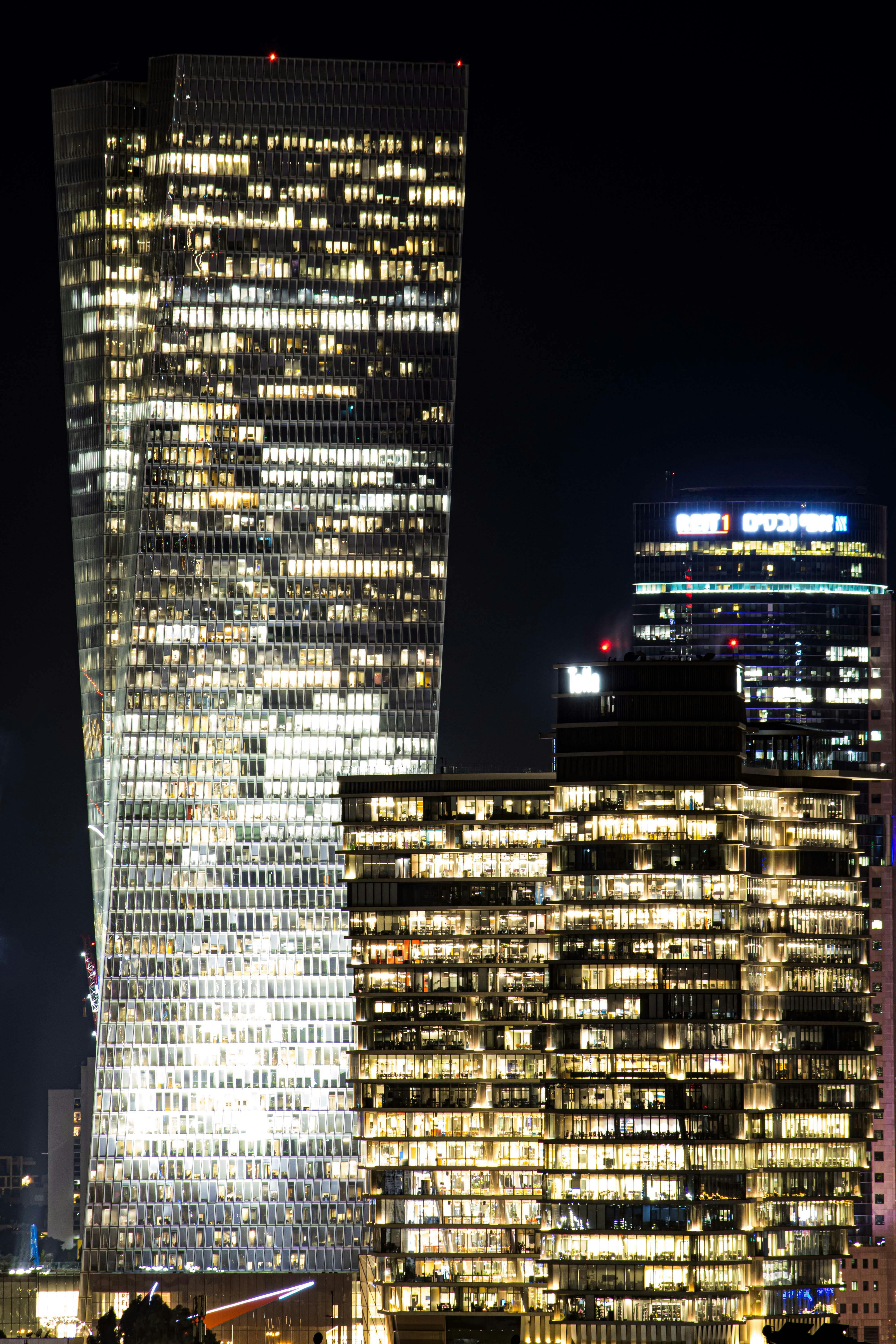 High Rise Buildings during Night Time · Free Stock Photo