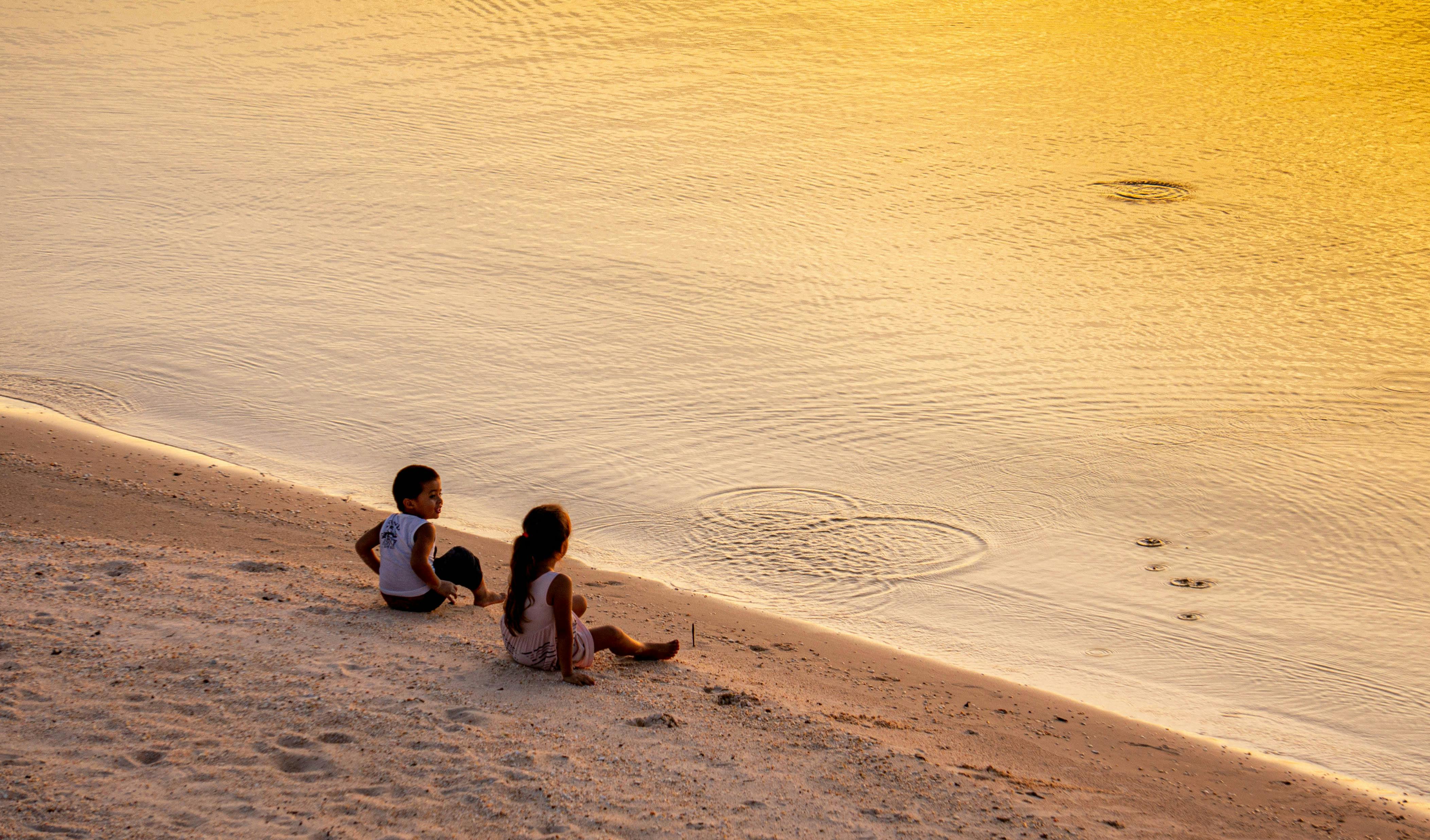A Silhouette of a Young Boy in Sunset · Free Stock Photo