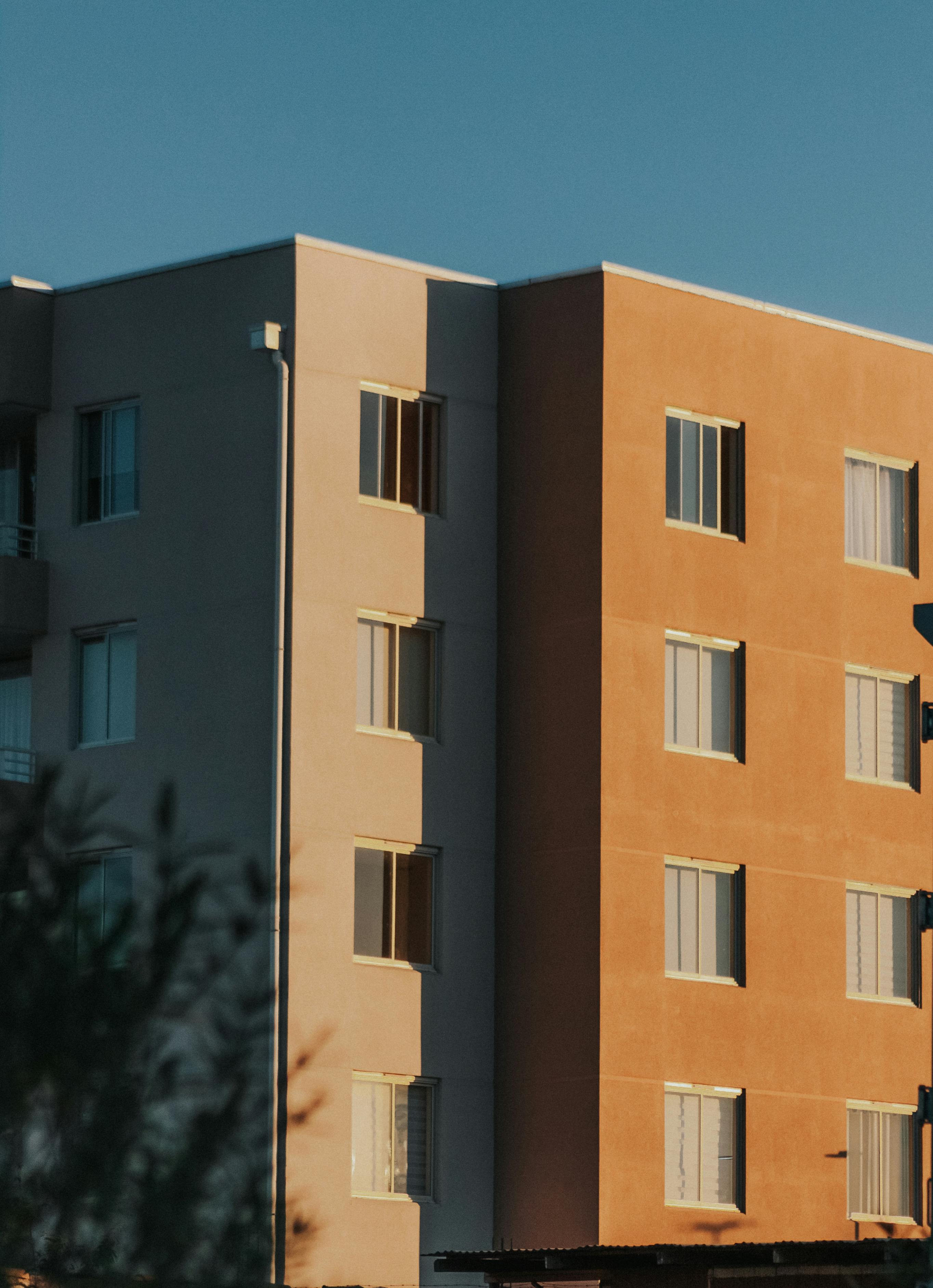 Sunlight on Building Walls · Free Stock Photo