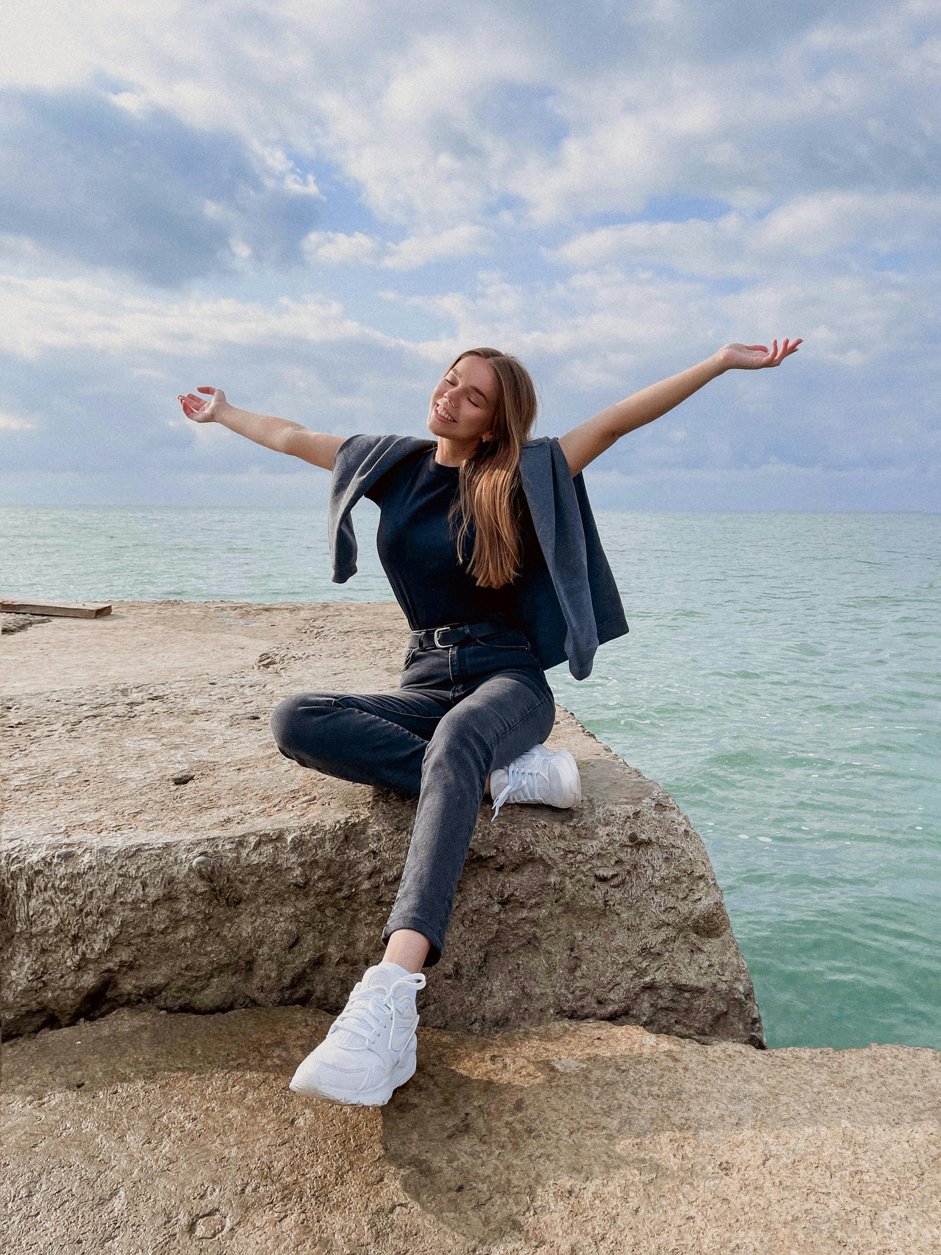 A Man Balancing on a Ladder · Free Stock Photo