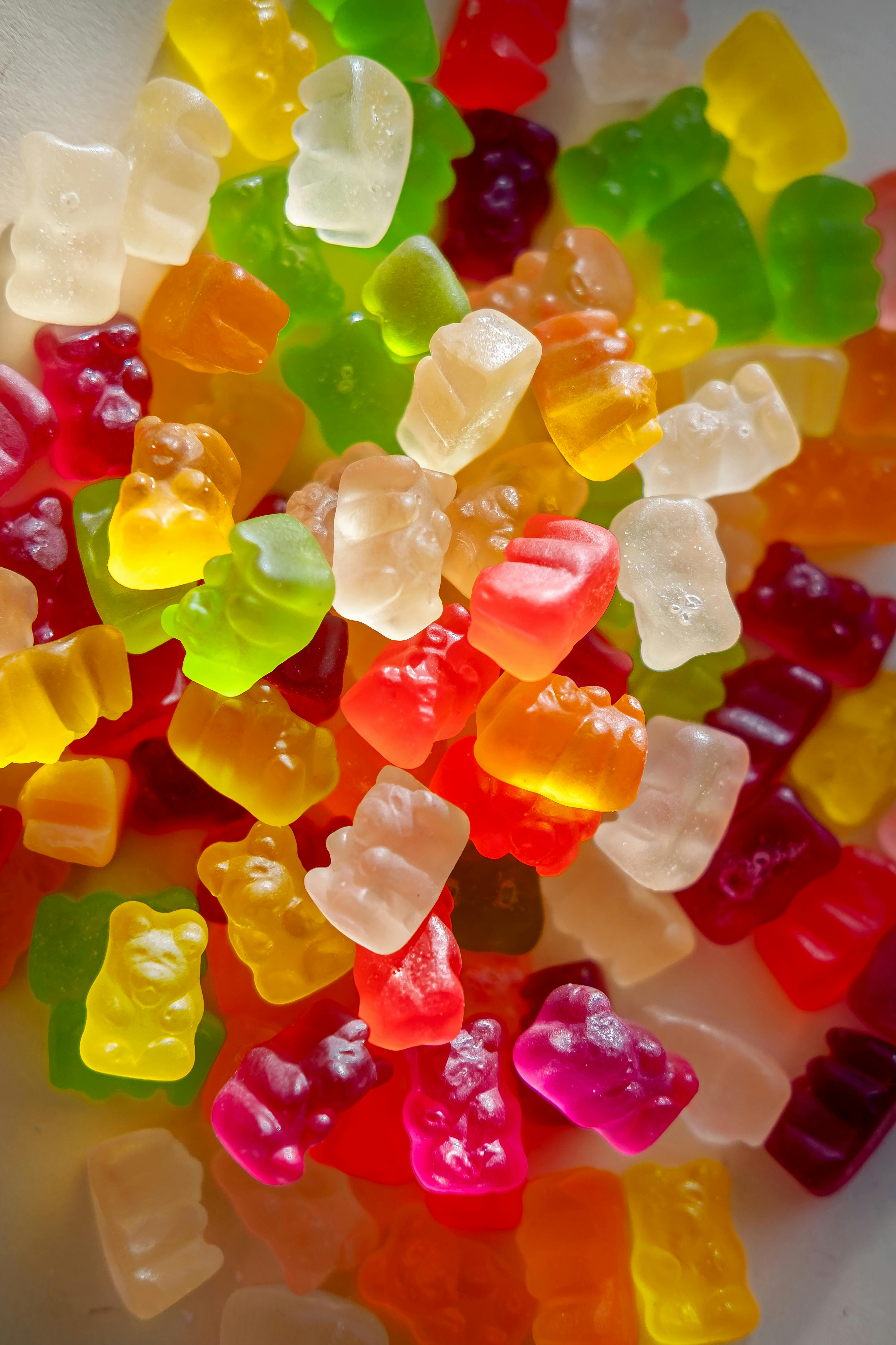 Close-up Photo of Coloful Sweet Candies and Gummies · Free Stock Photo