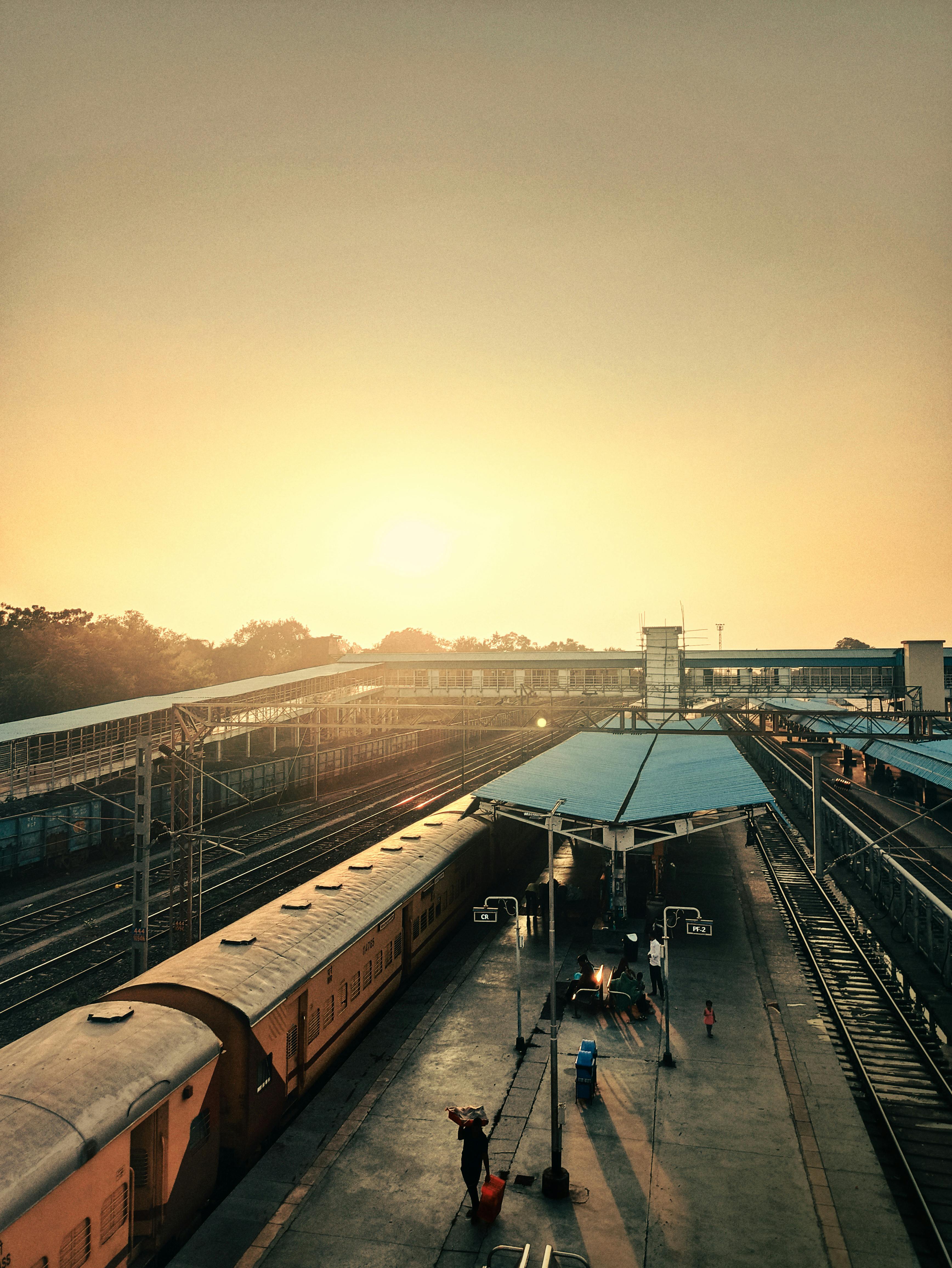 Aerial View of a Passenger Train at a Railway Station in City · Free ...