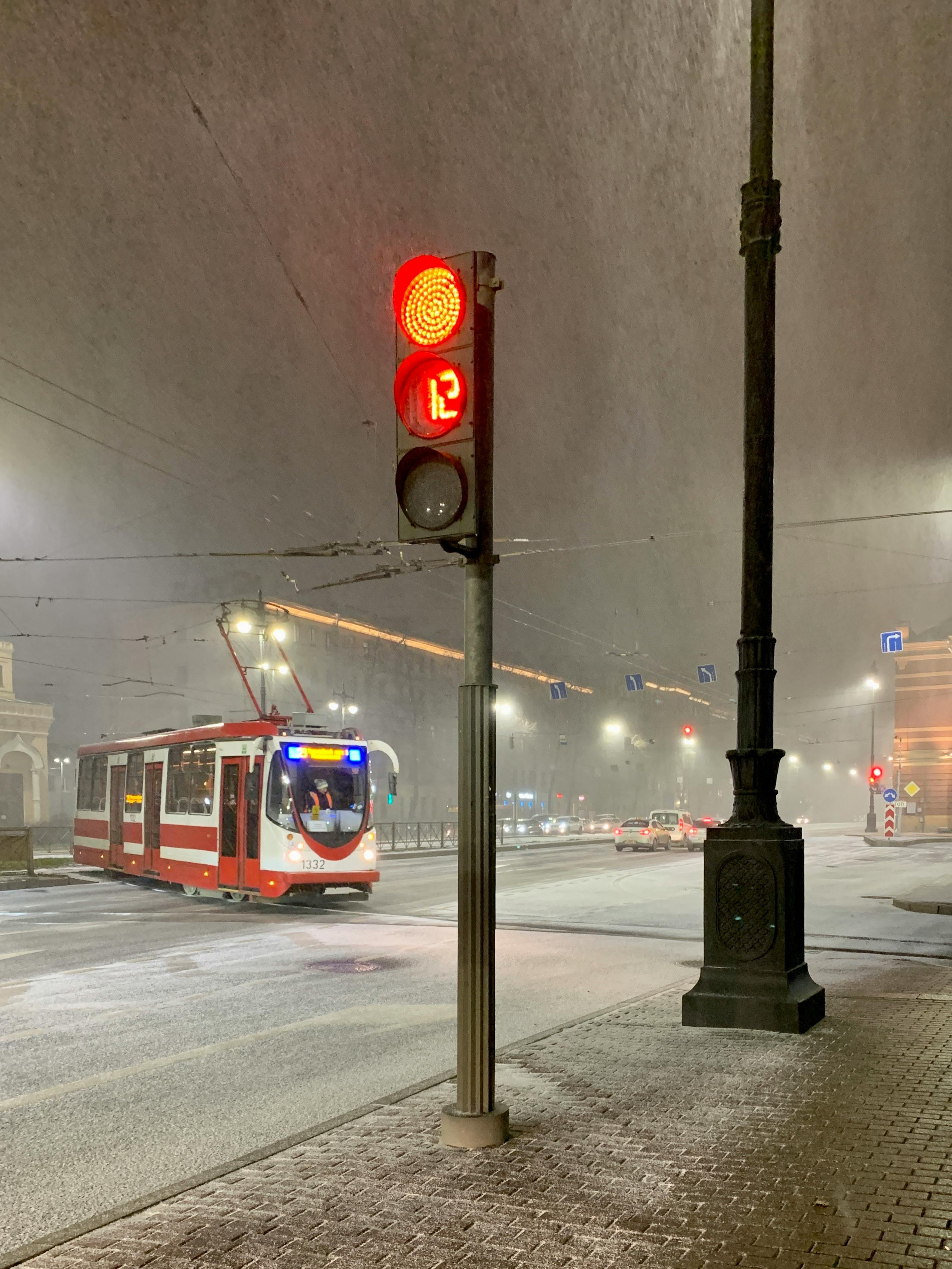 Red Stoplight by the Street and a Tram · Free Stock Photo