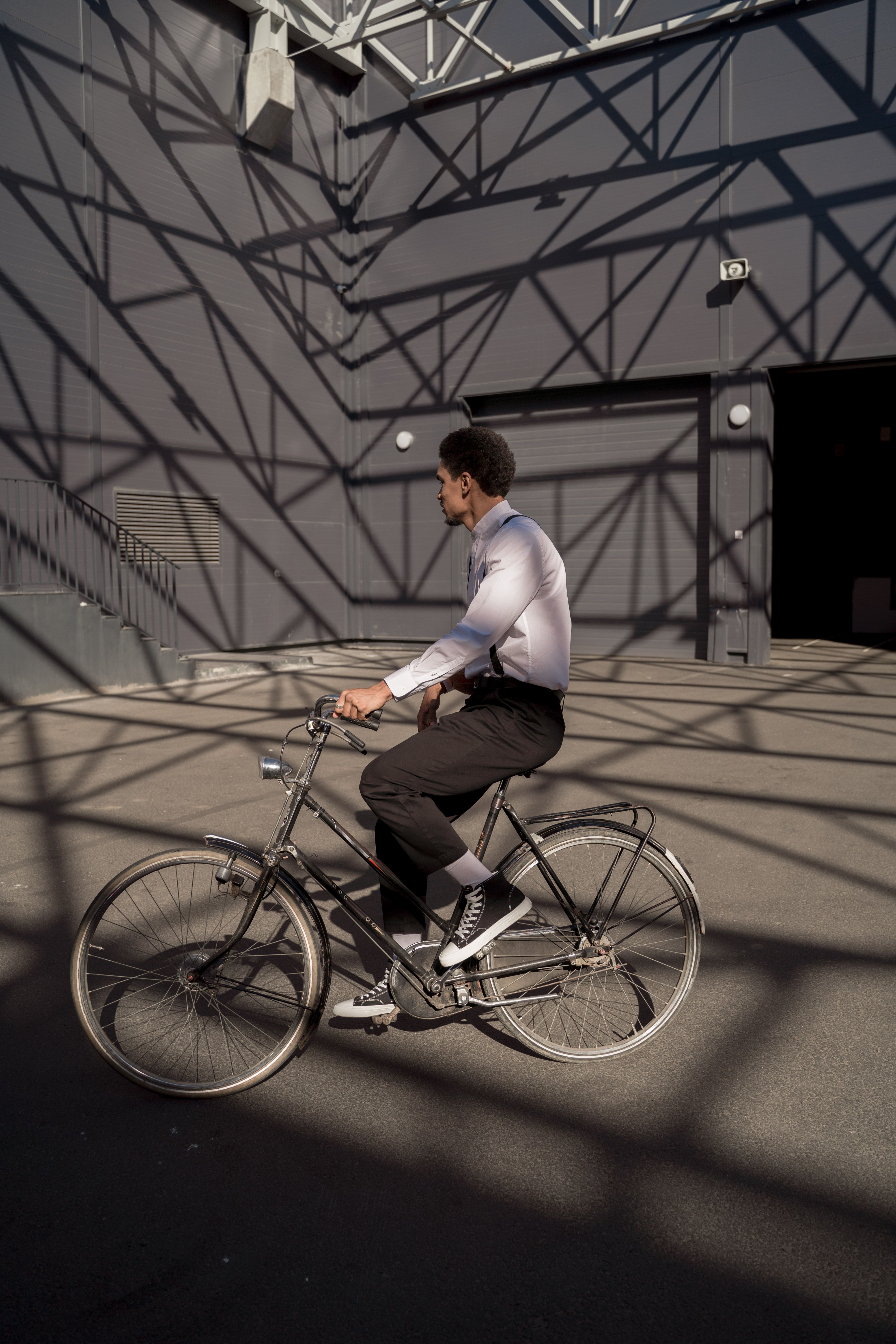 Stylish Man Riding a Bicycle · Free Stock Photo