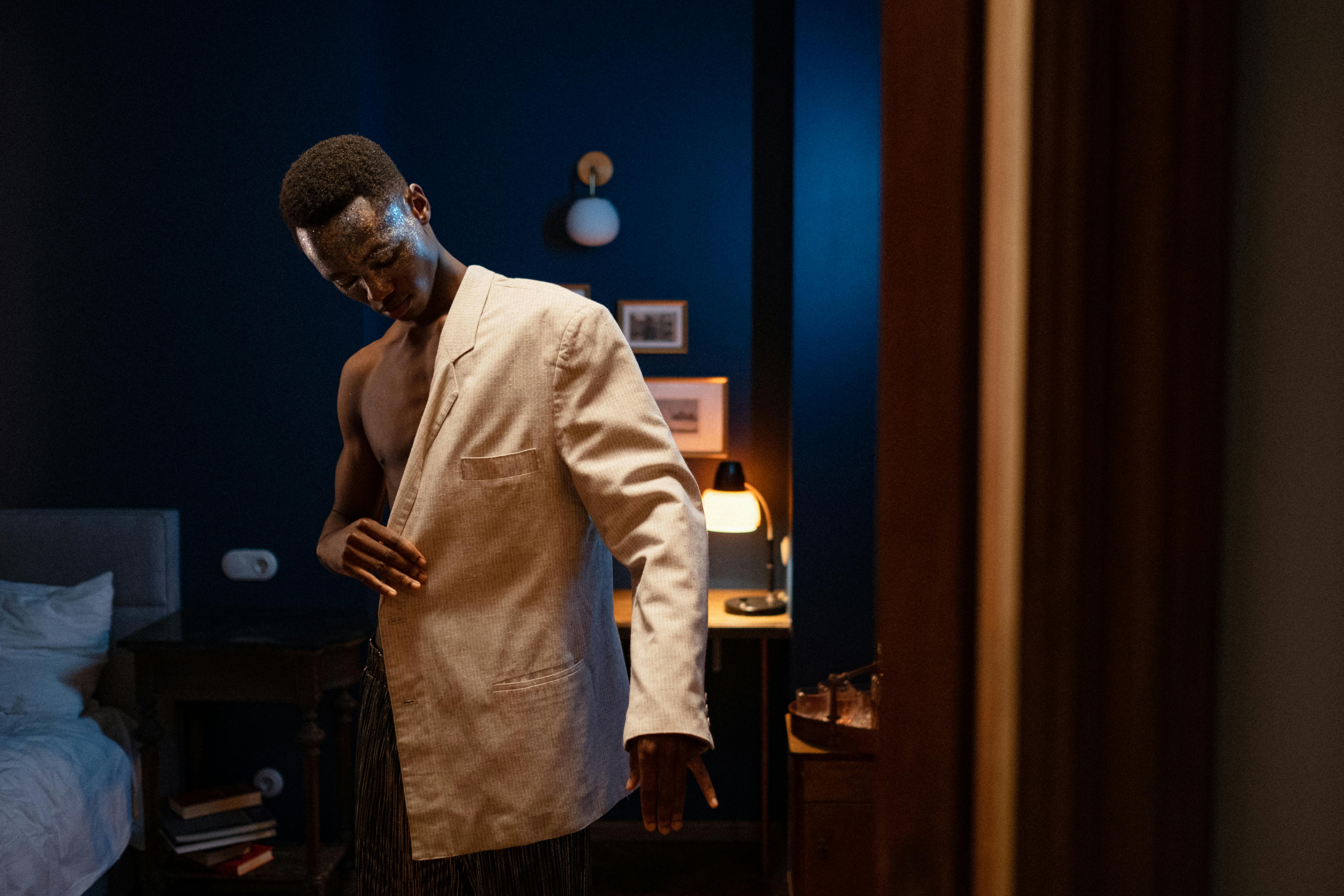 Man Standing in Bedroom and Dressing Up · Free Stock Photo