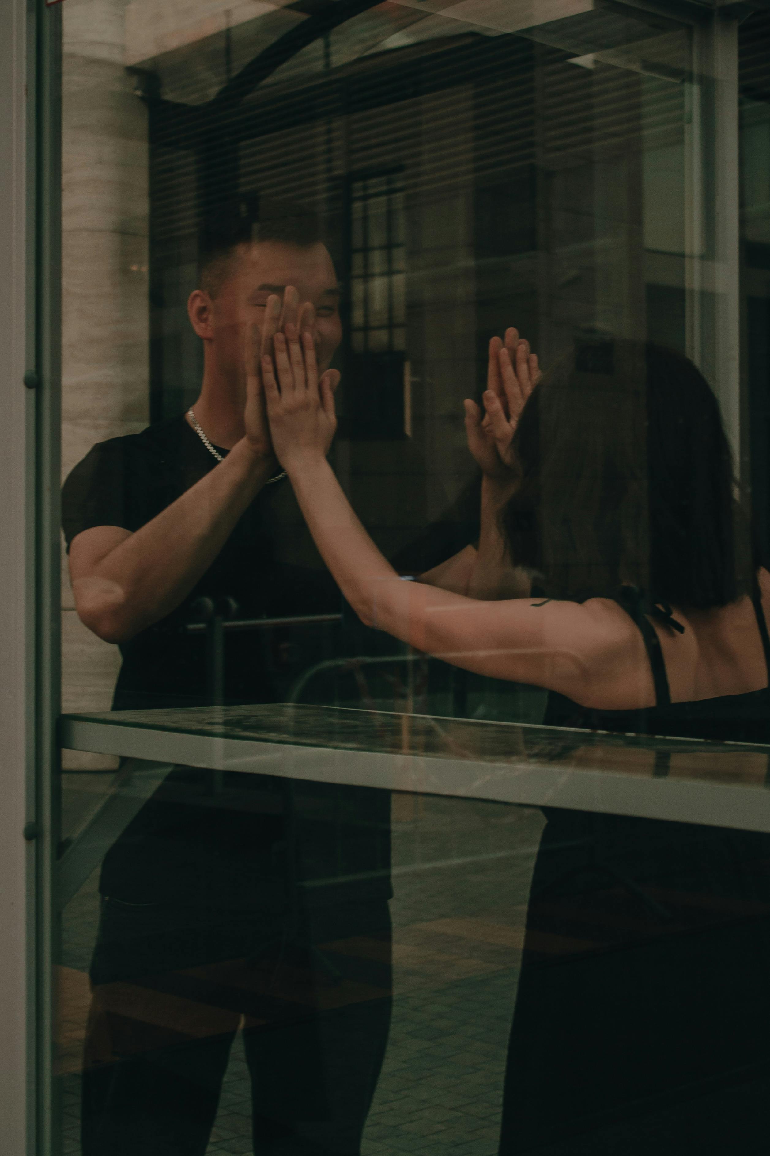 A Woman Touching a Man's Face · Free Stock Photo