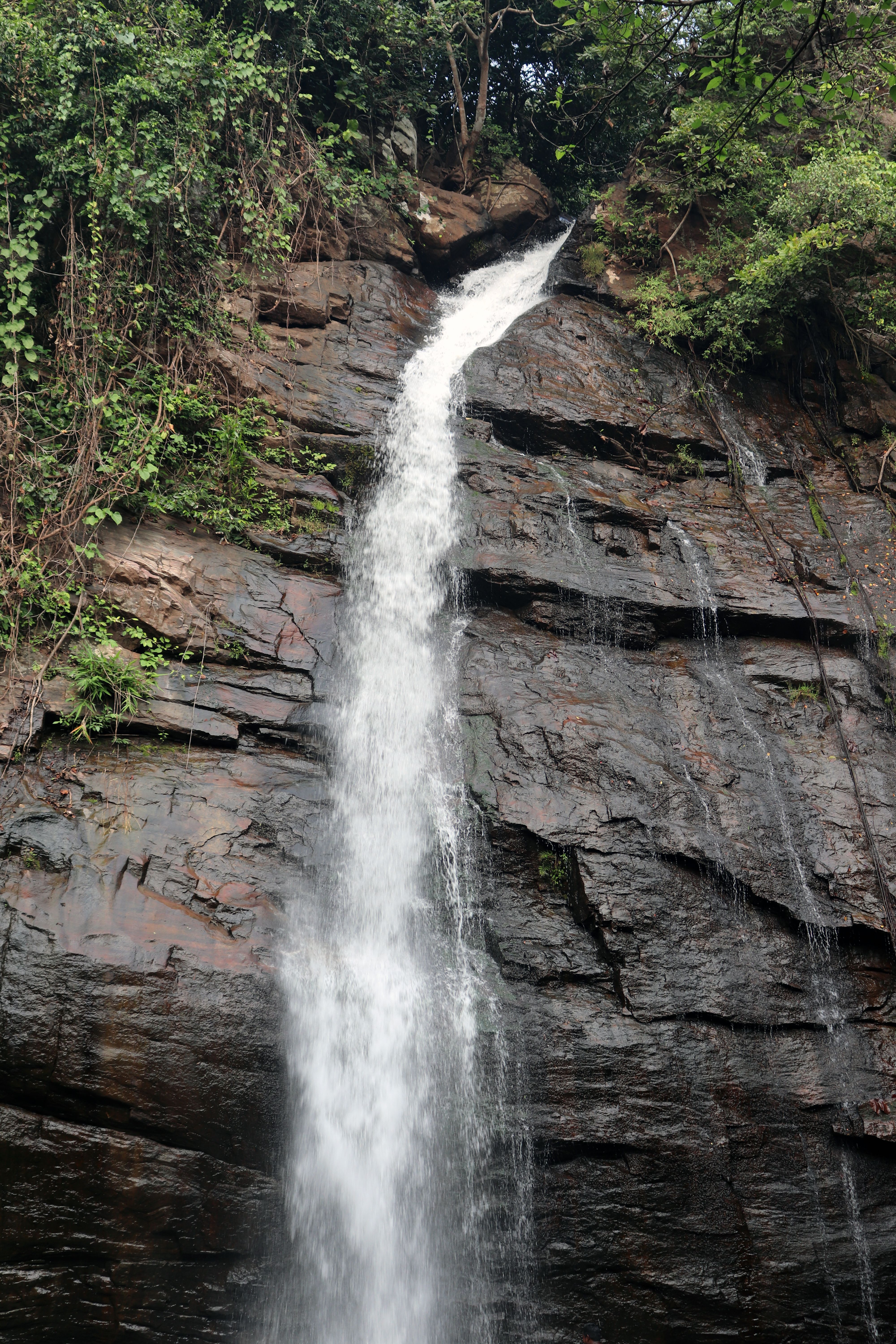 Waterfall on Rock Cliff · Free Stock Photo