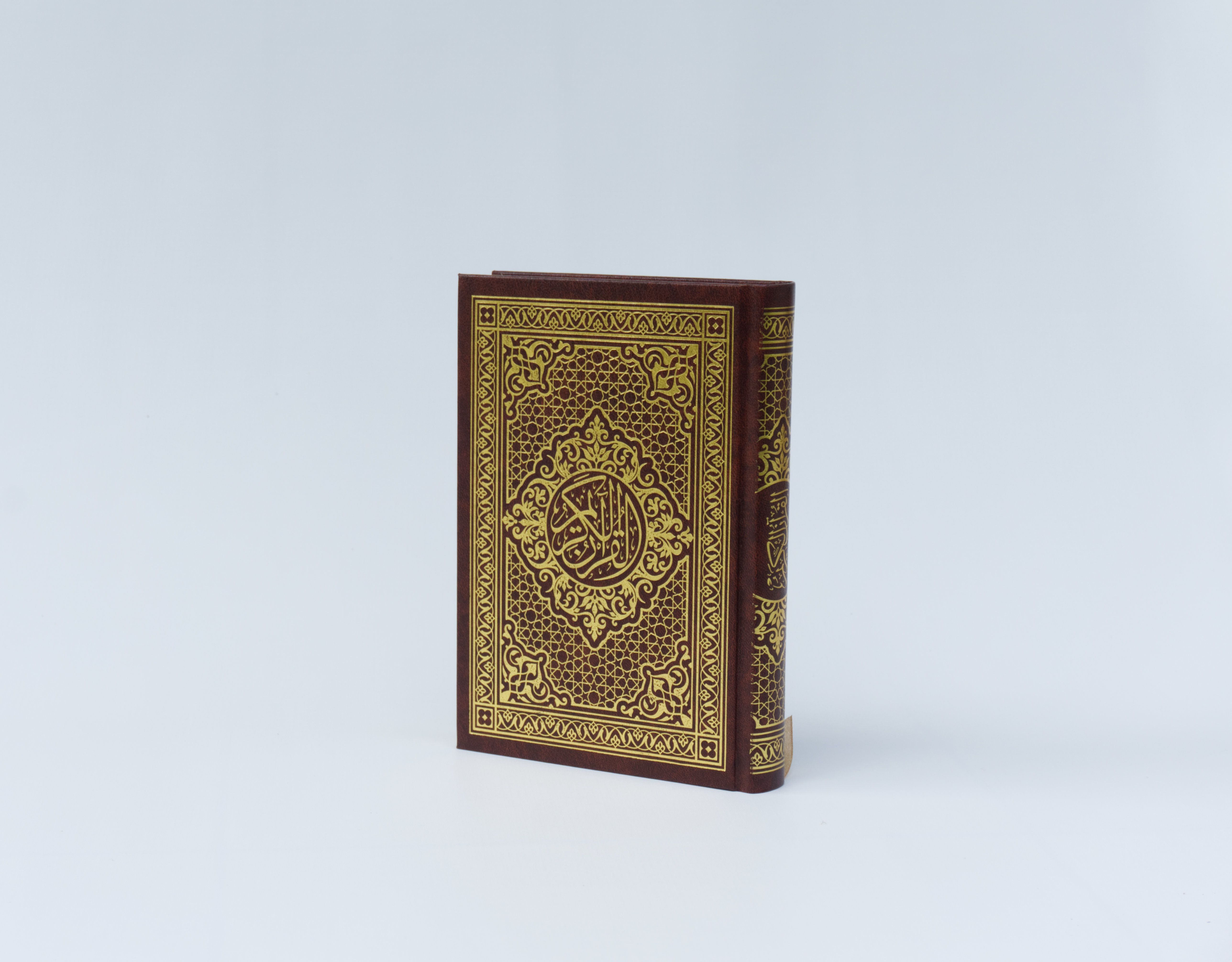 An Open Koran on a Wooden Table · Free Stock Photo