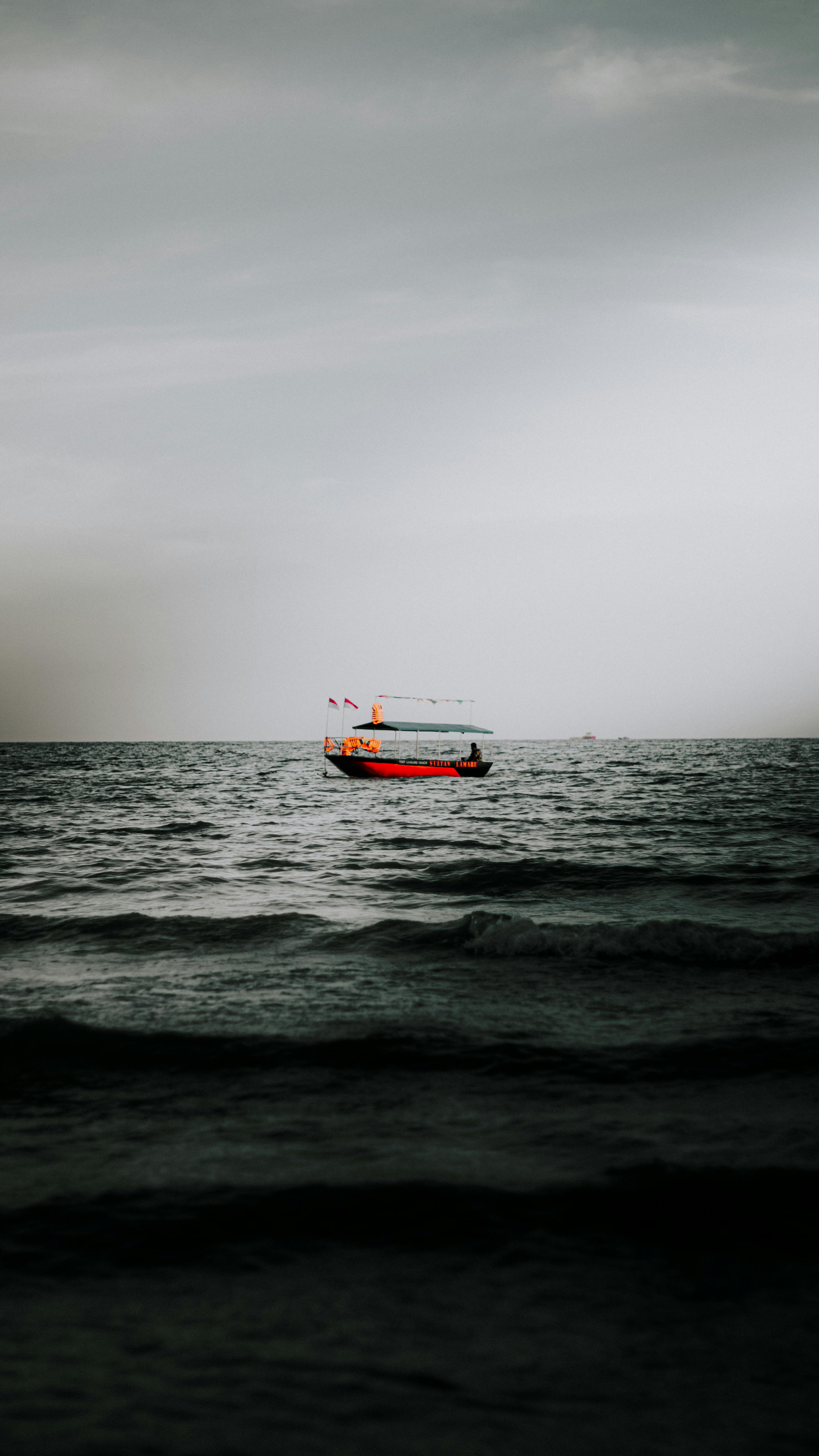 A Boat Out in the Sea · Free Stock Photo