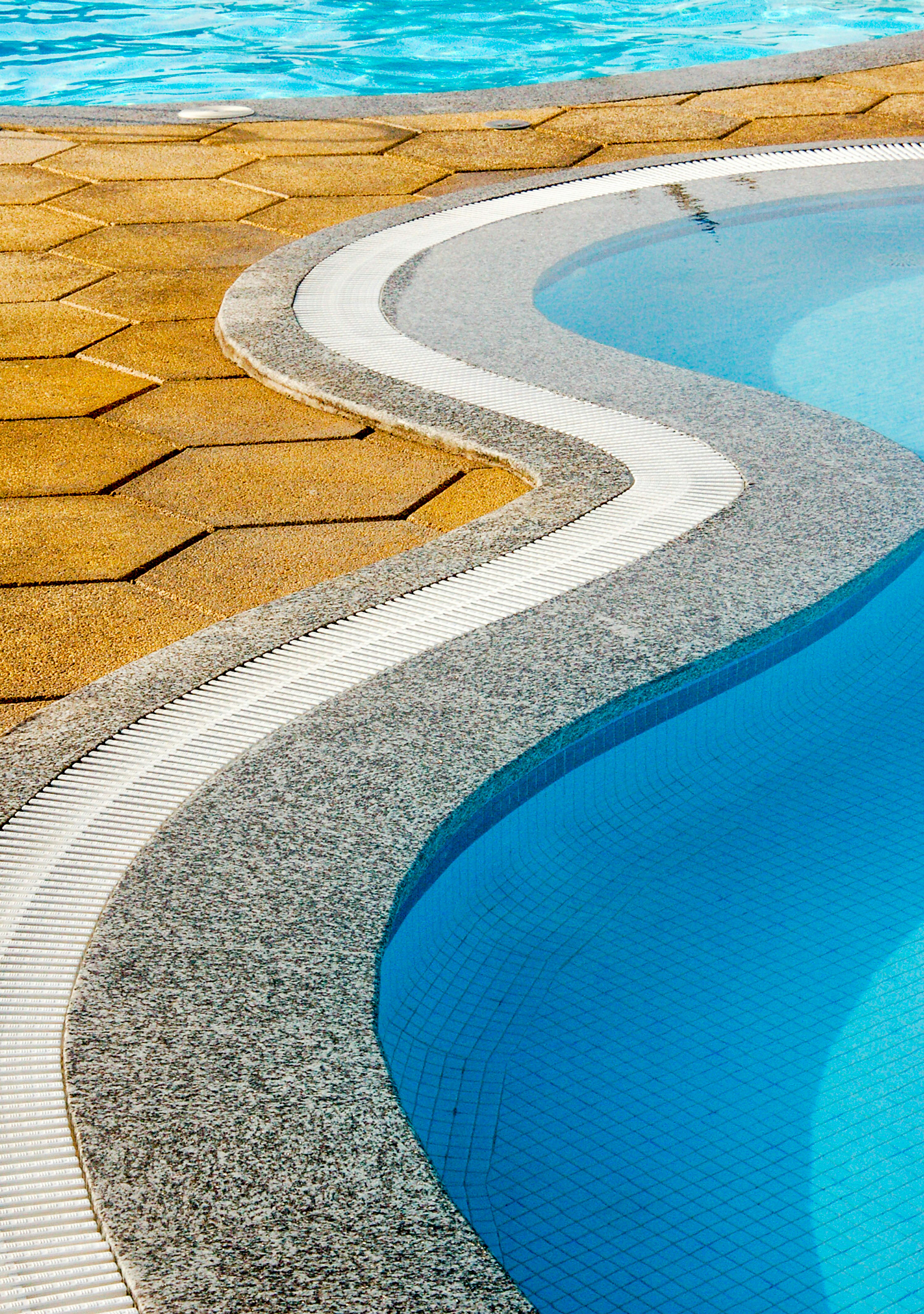 Edge of a Swimming Pool · Free Stock Photo