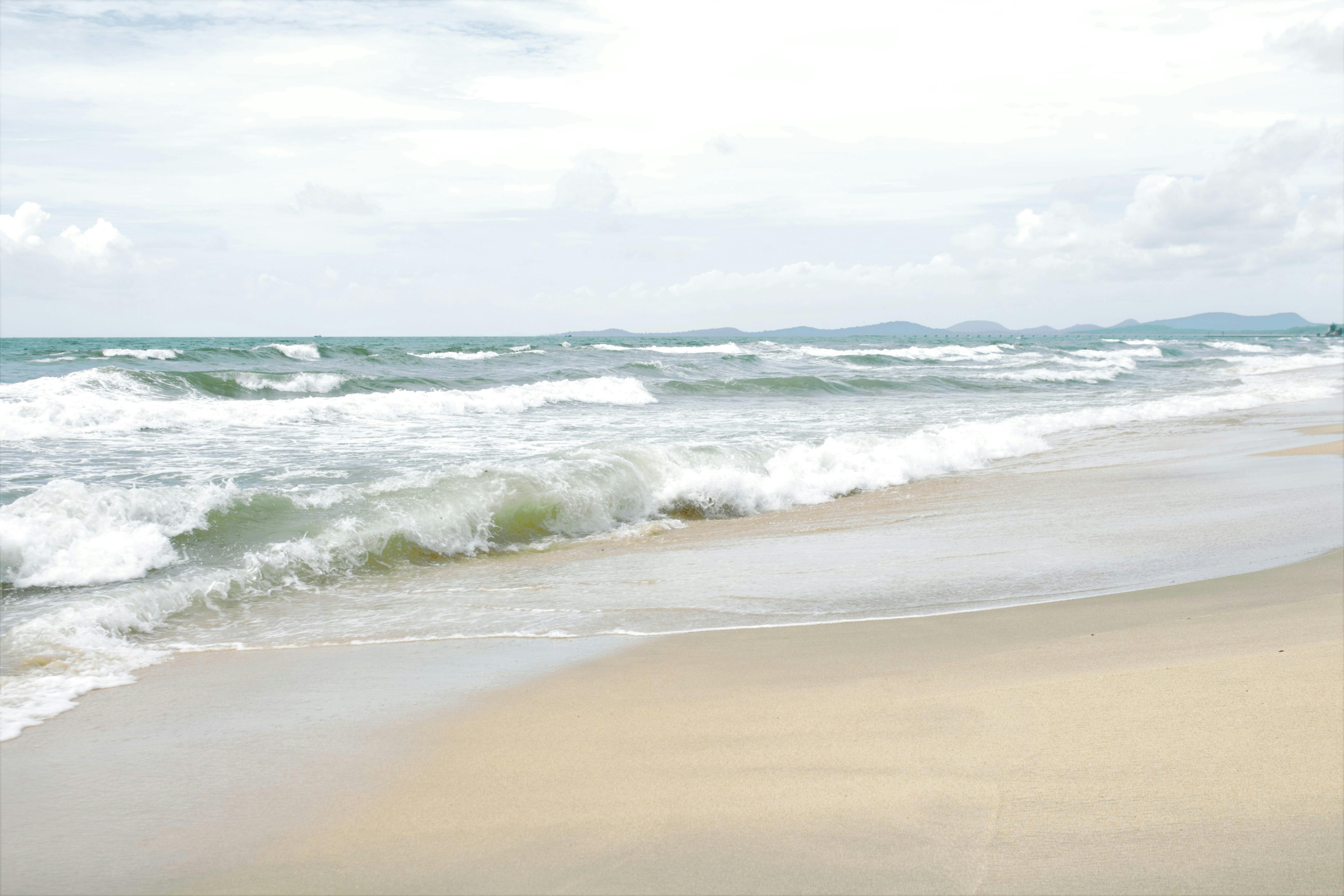 Crashing Waves on Beach Shore · Free Stock Photo