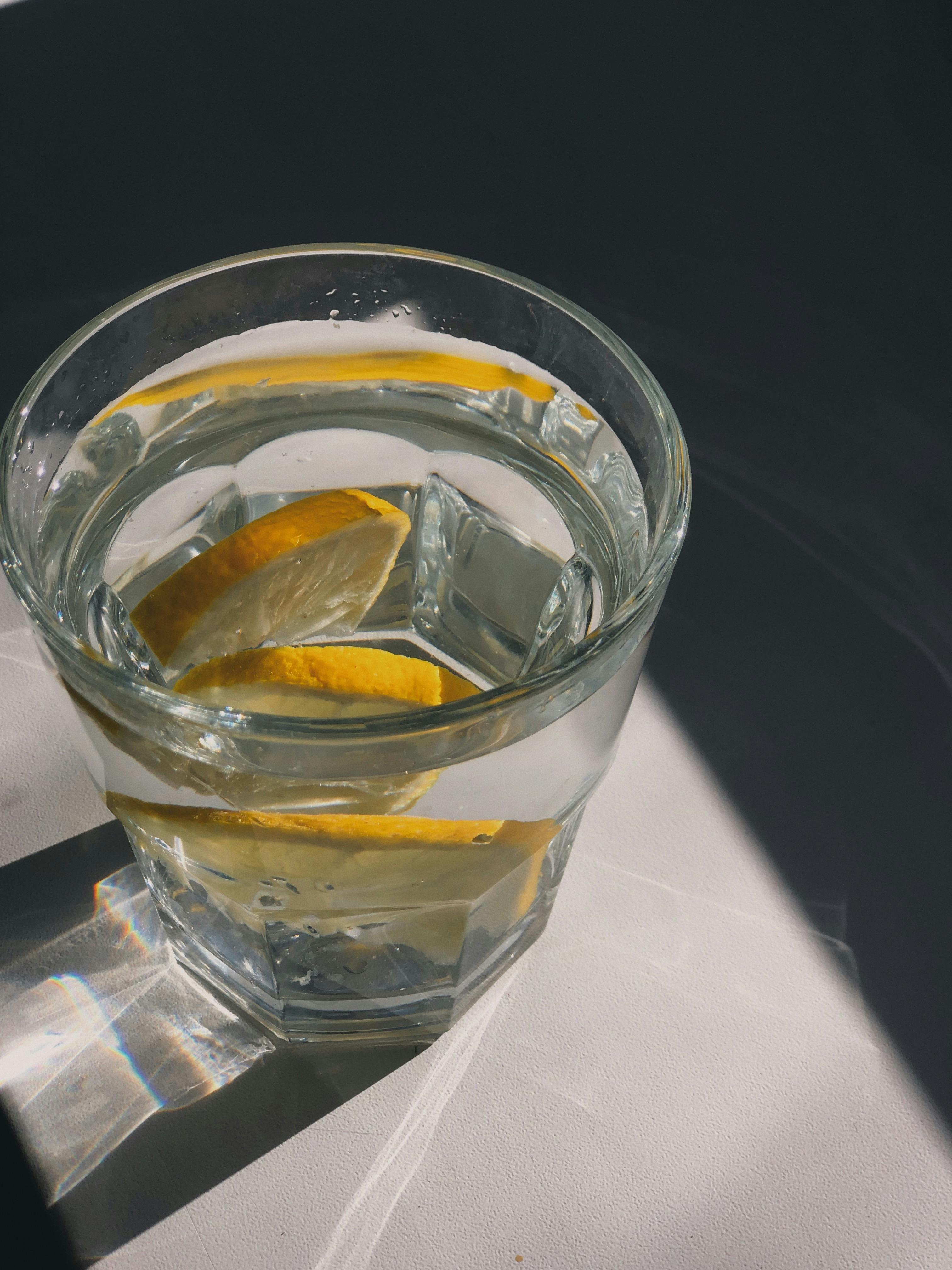 Yellow Lemonade on Clear Glass Saucer · Free Stock Photo